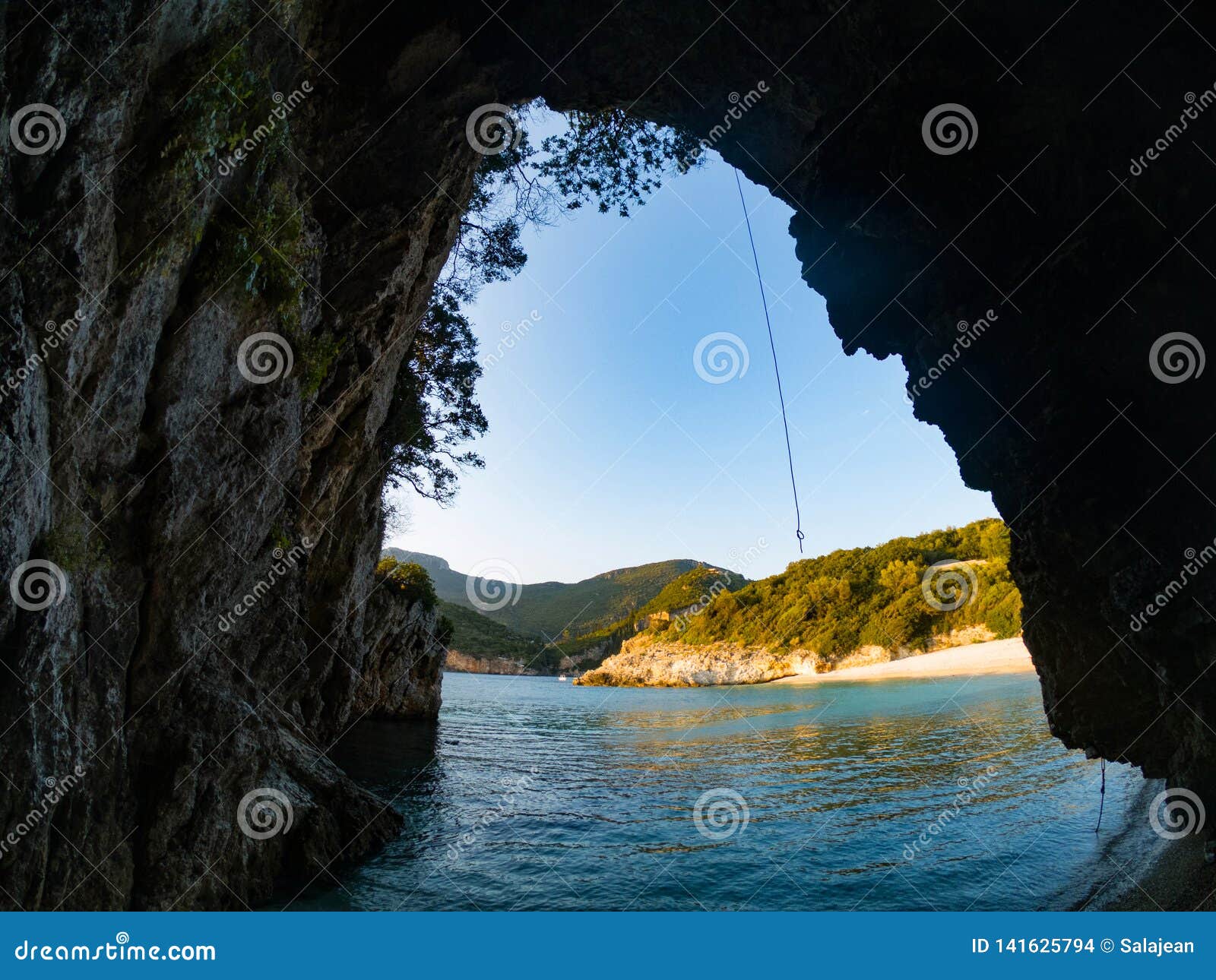 Sea cave in Corfu stock photo. Image of arch, mediterranean - 141625794
