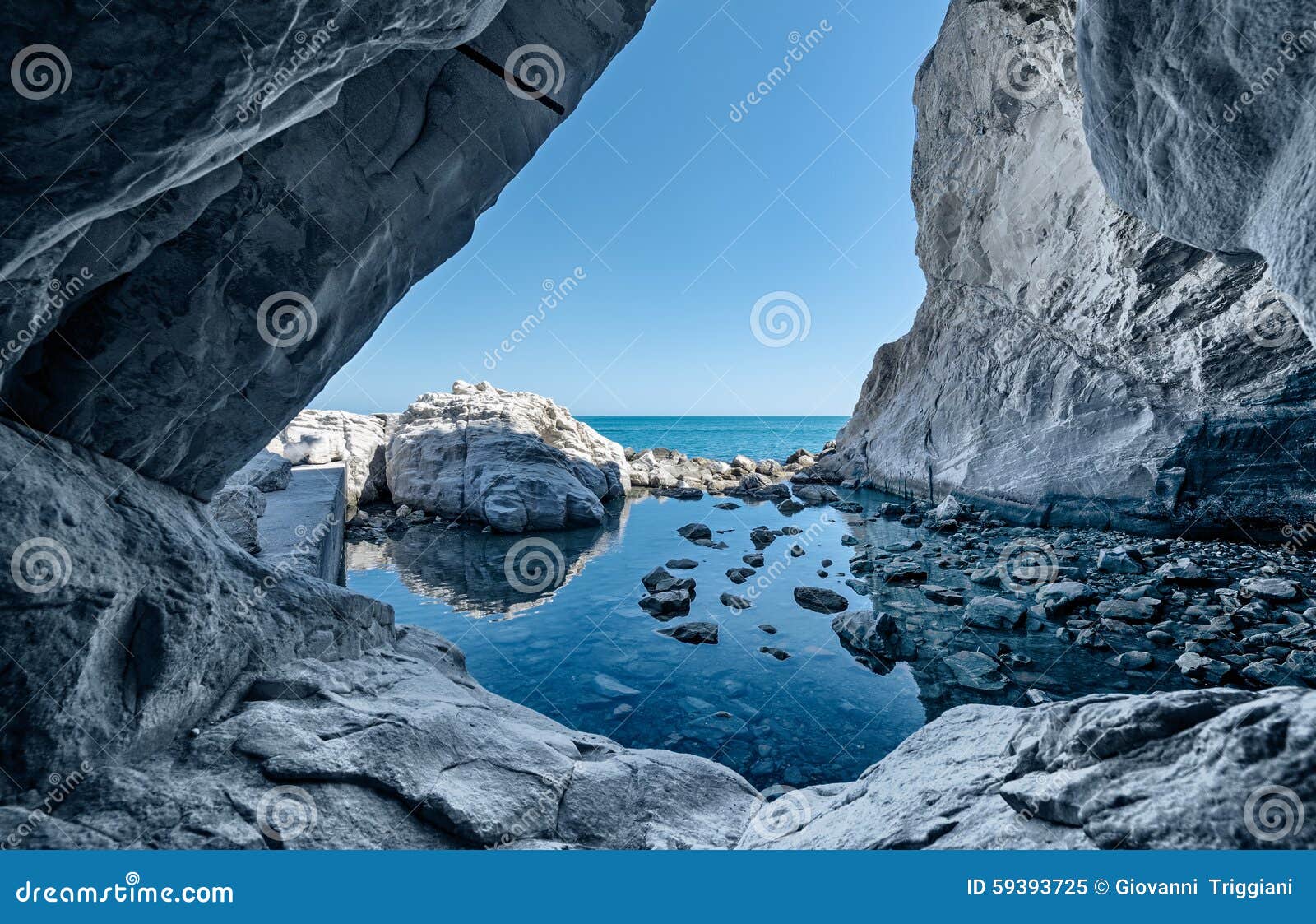 Sea Cave Rocks. Grotto with Water Reflections Stock Image - Image of ...