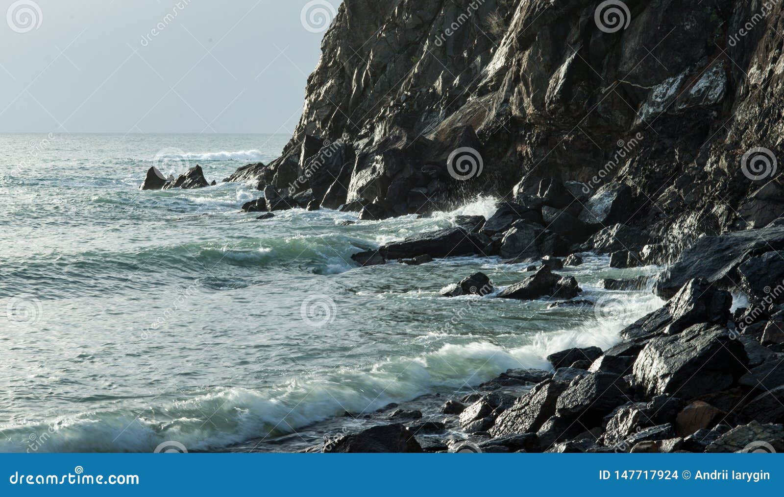 Sea cliff stock photo. Image of cliff, rocks, waves - 147717924