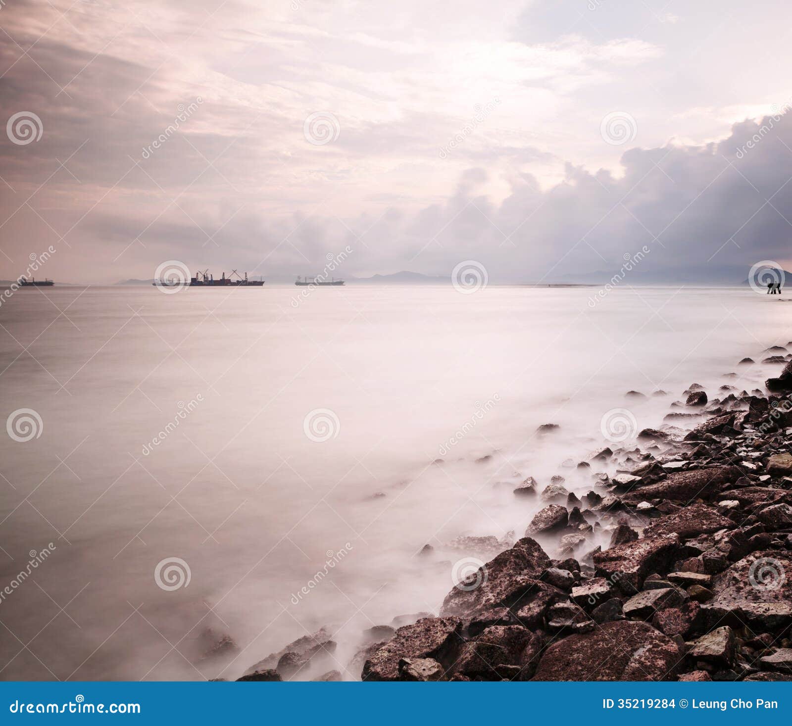 Sea coast ripple and rock stock photo. Image of exposure - 35219284