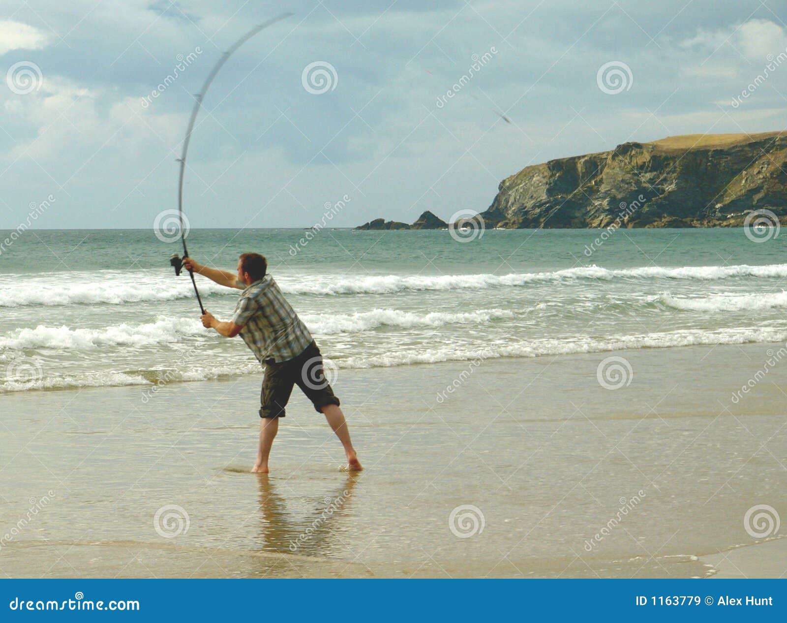 Sea Fishing on Beach stock image. Image of fishing, rock - 1163779
