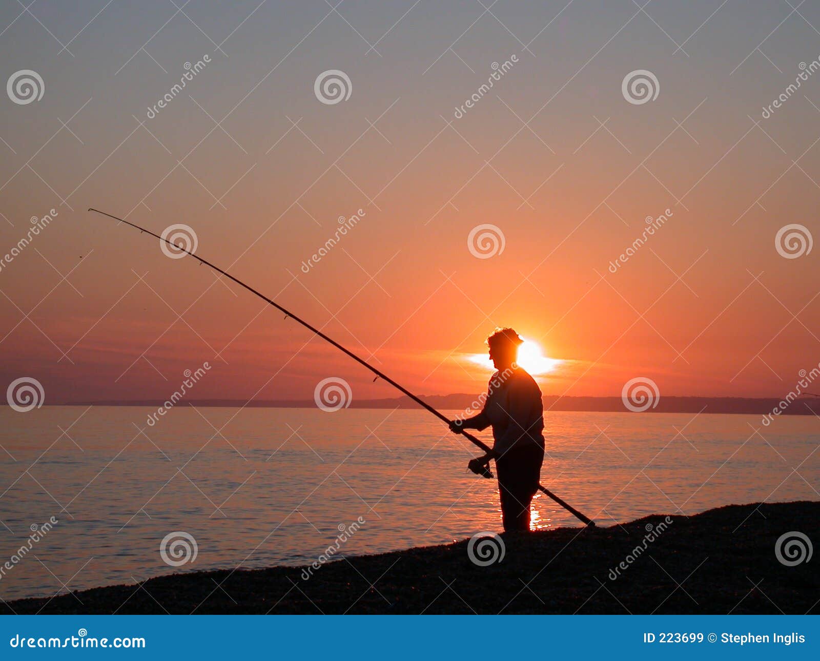 Sea fishing at dusk stock image. Image of beach, evening - 223699