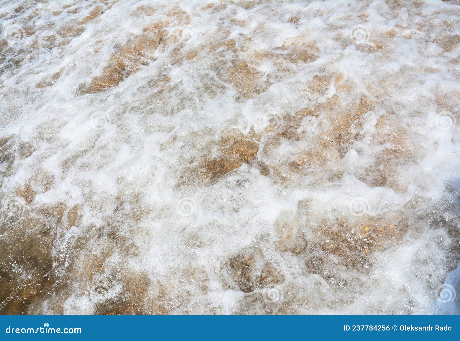 Sea Foam on a Sandy Beach. Raging Sea Foam Water Background Stock Photo ...