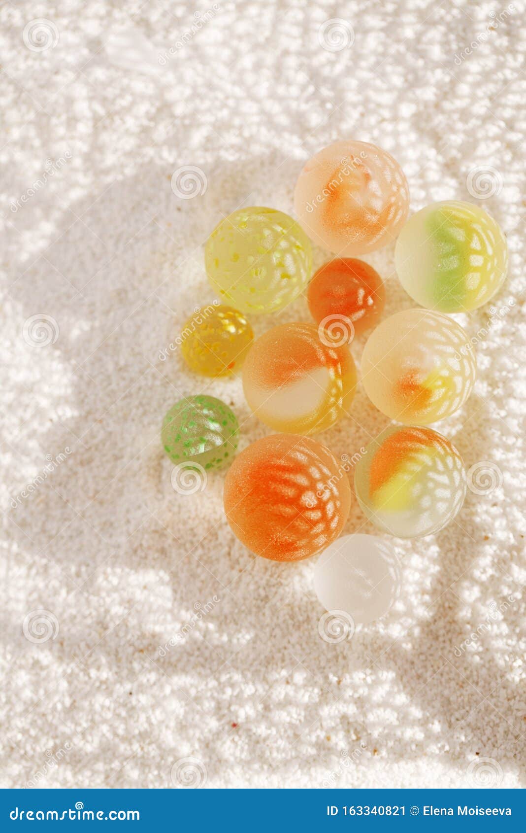 Sea Glass Marbles on White Sand Beach Stock Image - Image of background ...