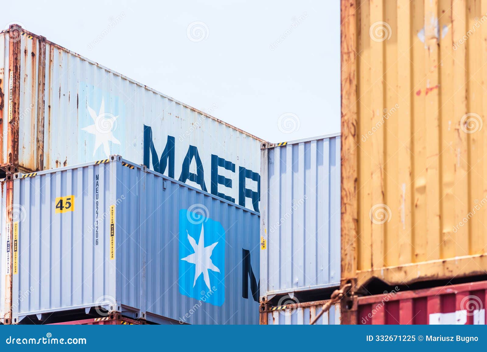 Stack Of Containers Stored In The Container Terminal. Maersk Line Logos ...
