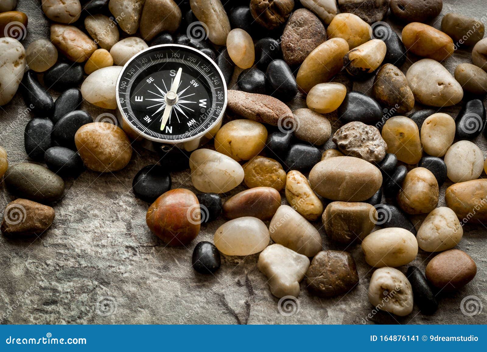 Sea Journey, Travelling and Vacation Concept. Compass on Rocks and Grey ...