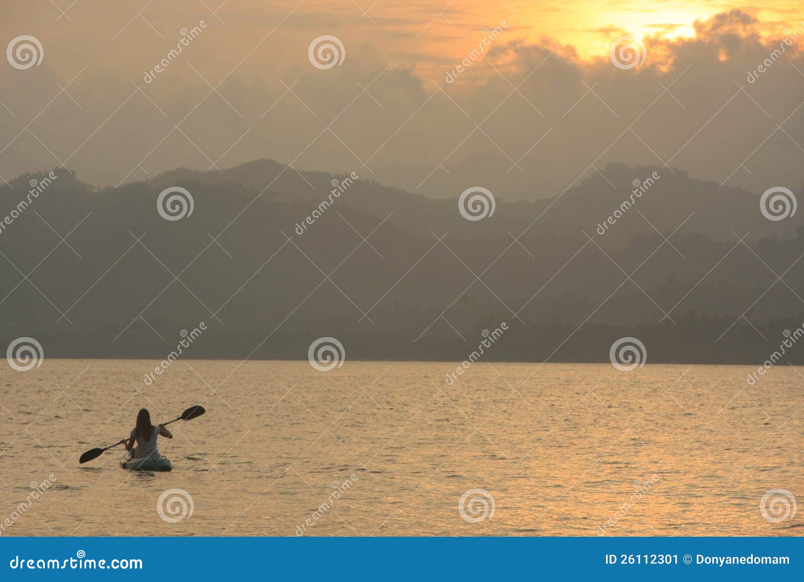 Sea kayaking at sunrise stock image. Image of cloud, sunset - 26112301