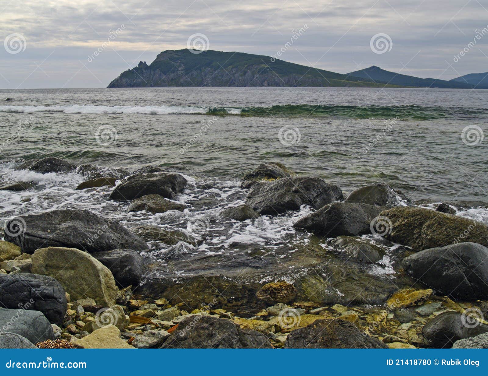 Sea Landscape with Boulders in the Foreground Stock Photo - Image of ...
