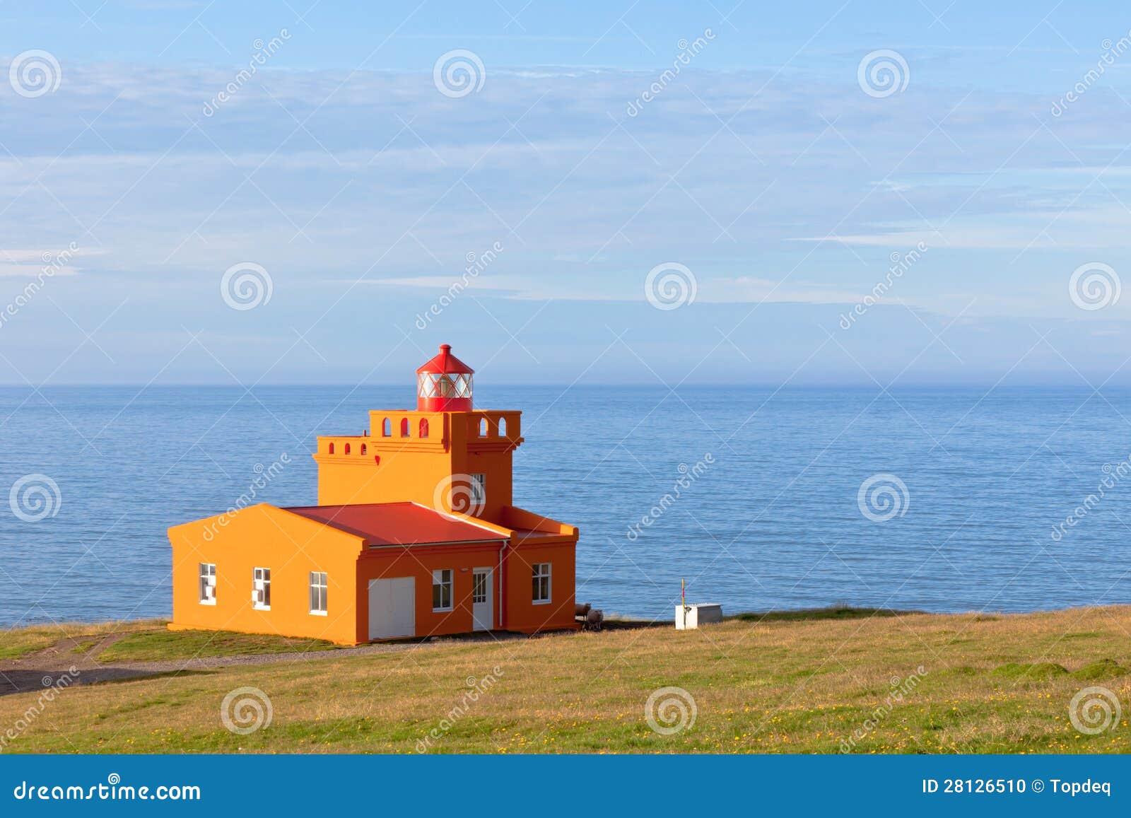 Sea Landscape with Orange Lighthouse and Blue Sky Stock Photo - Image ...