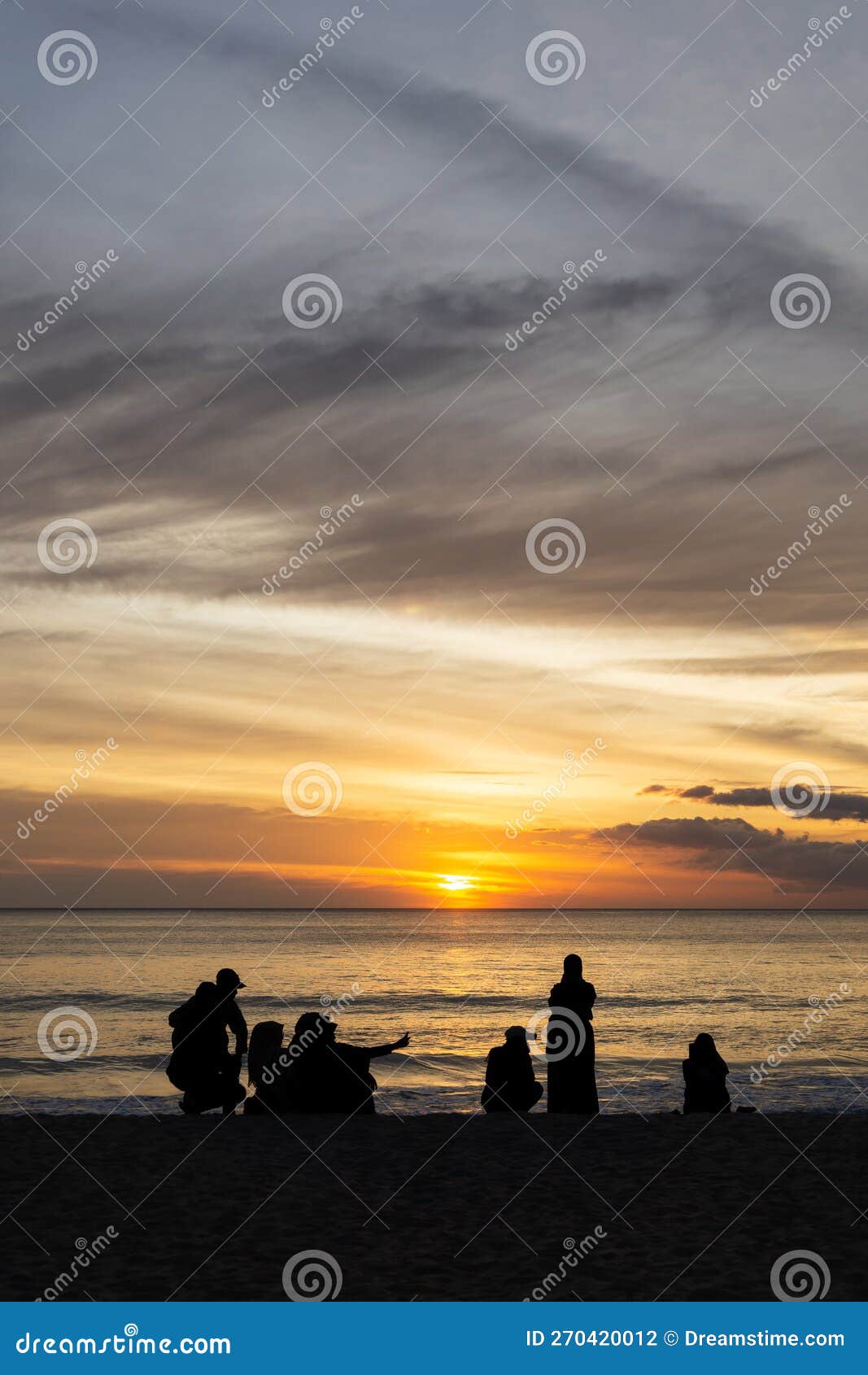 Sea Landscape at Sunset. Group of People Enjoying Sunset View at the ...
