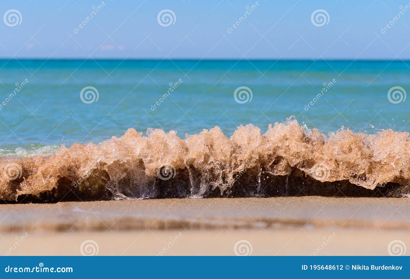 Sea muddy wave with sand. stock photo. Image of high - 195648612
