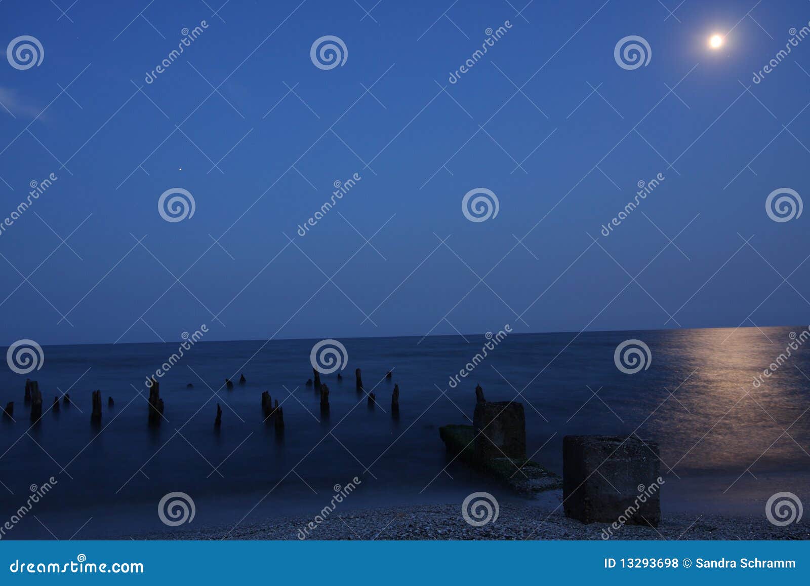 Sea at night stock photo. Image of shine, view, poles - 13293698