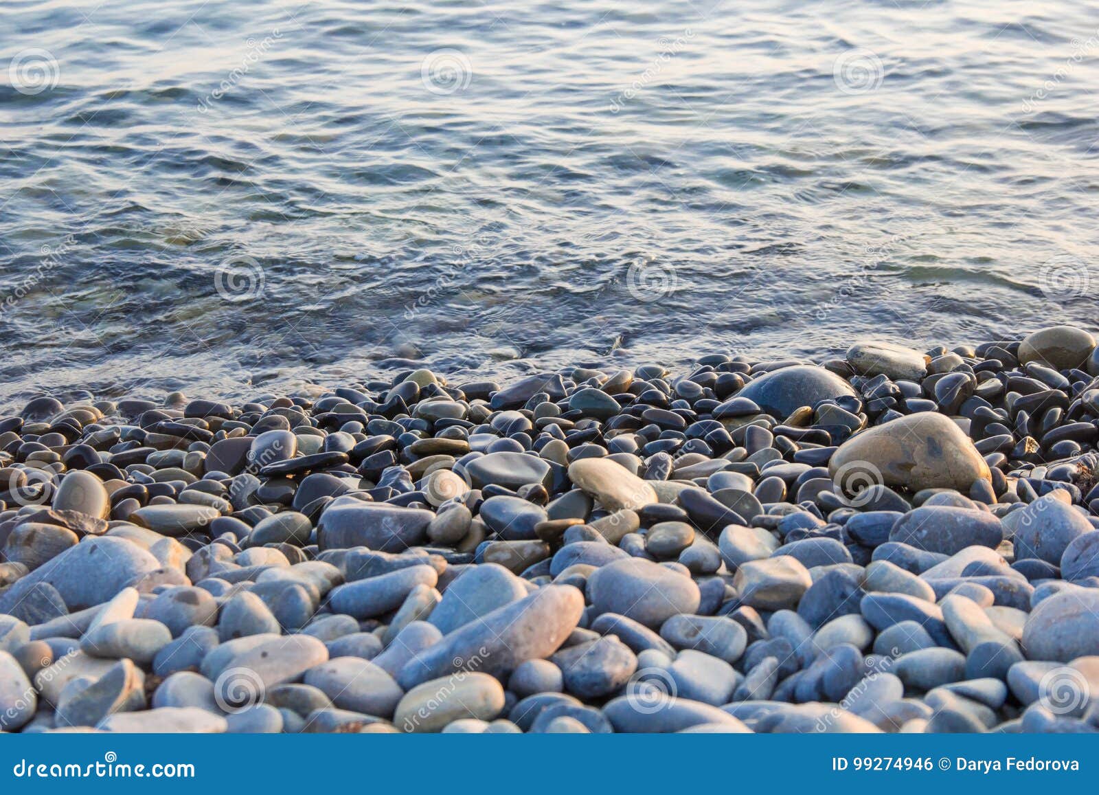 Sea and Pebbles Underwater in a Beach. Pebble Background Stock Photo ...