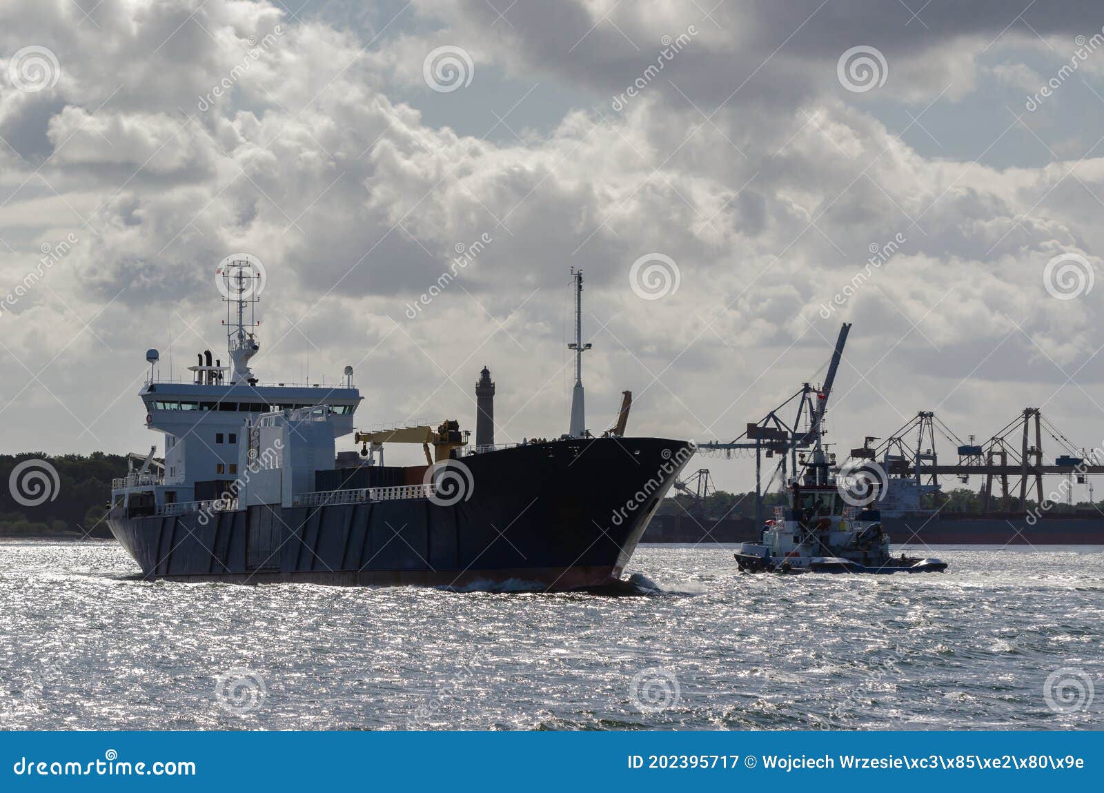 Big Freighter Or Cruise Ship Loading At The Harbor. Industrial ...