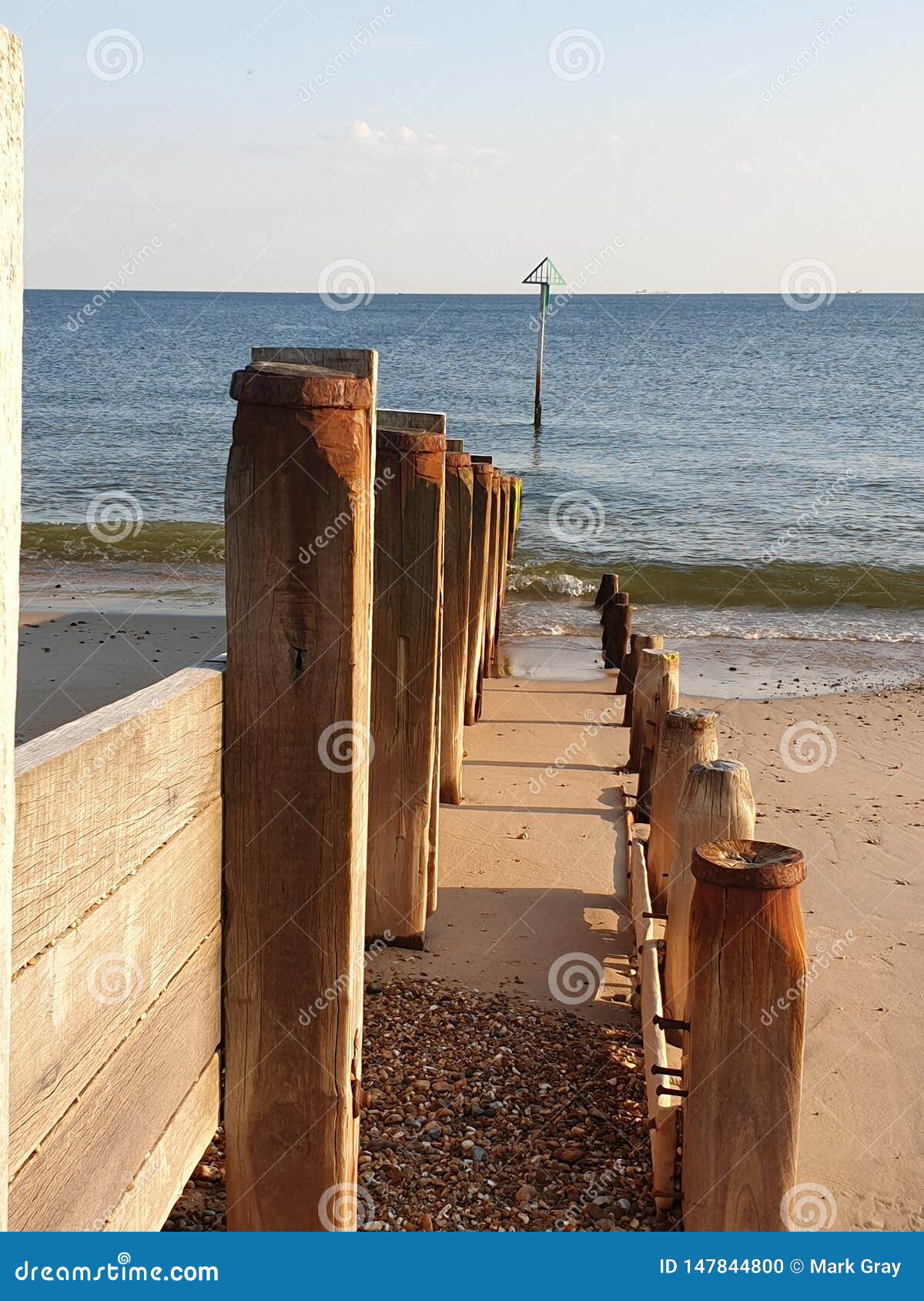 Sea Posts stock photo. Image of beach, wooden, sand - 147844800