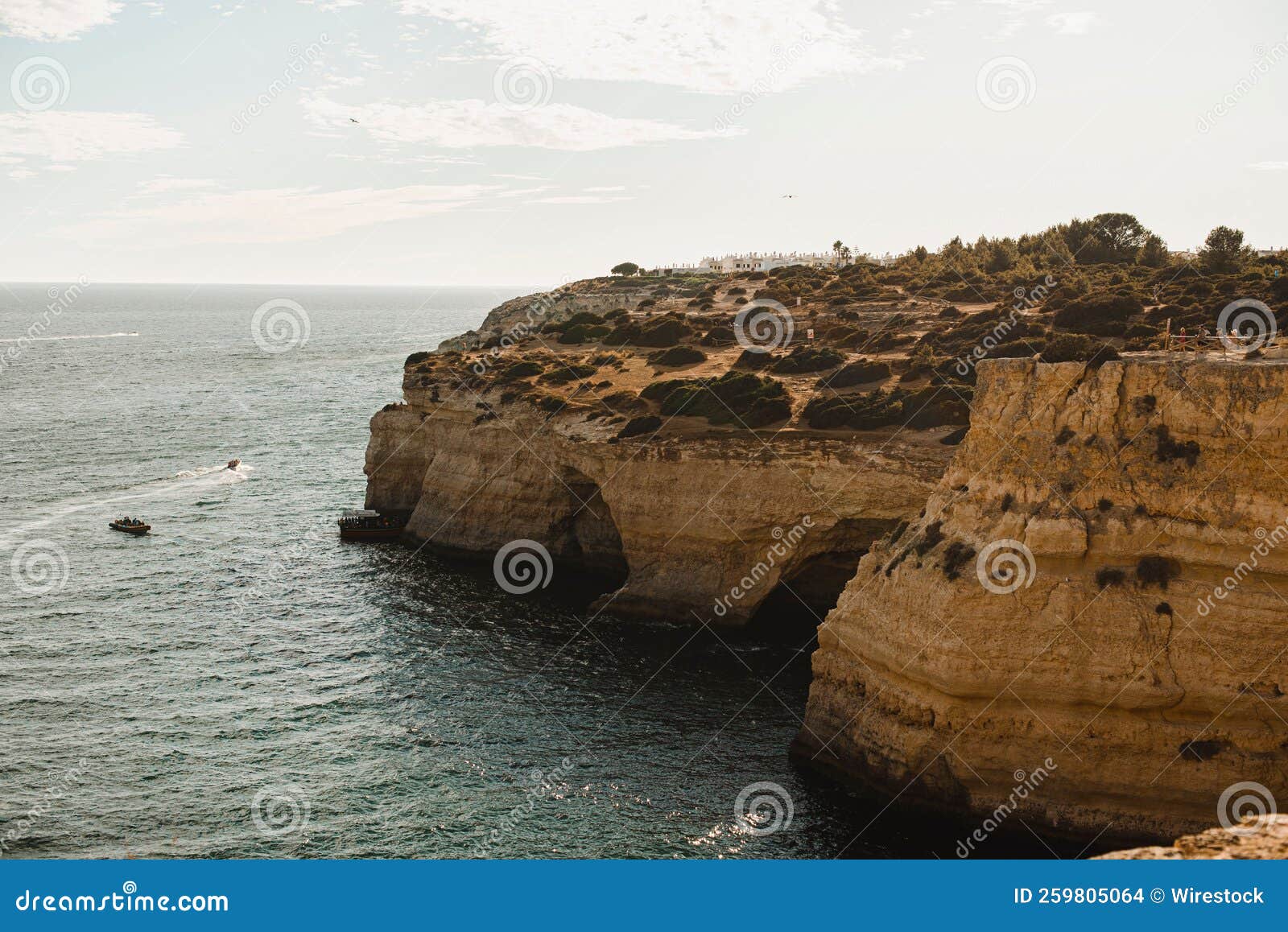 Sea Rock Cliffs with a Cloudy Sky Stock Photo - Image of landscape ...