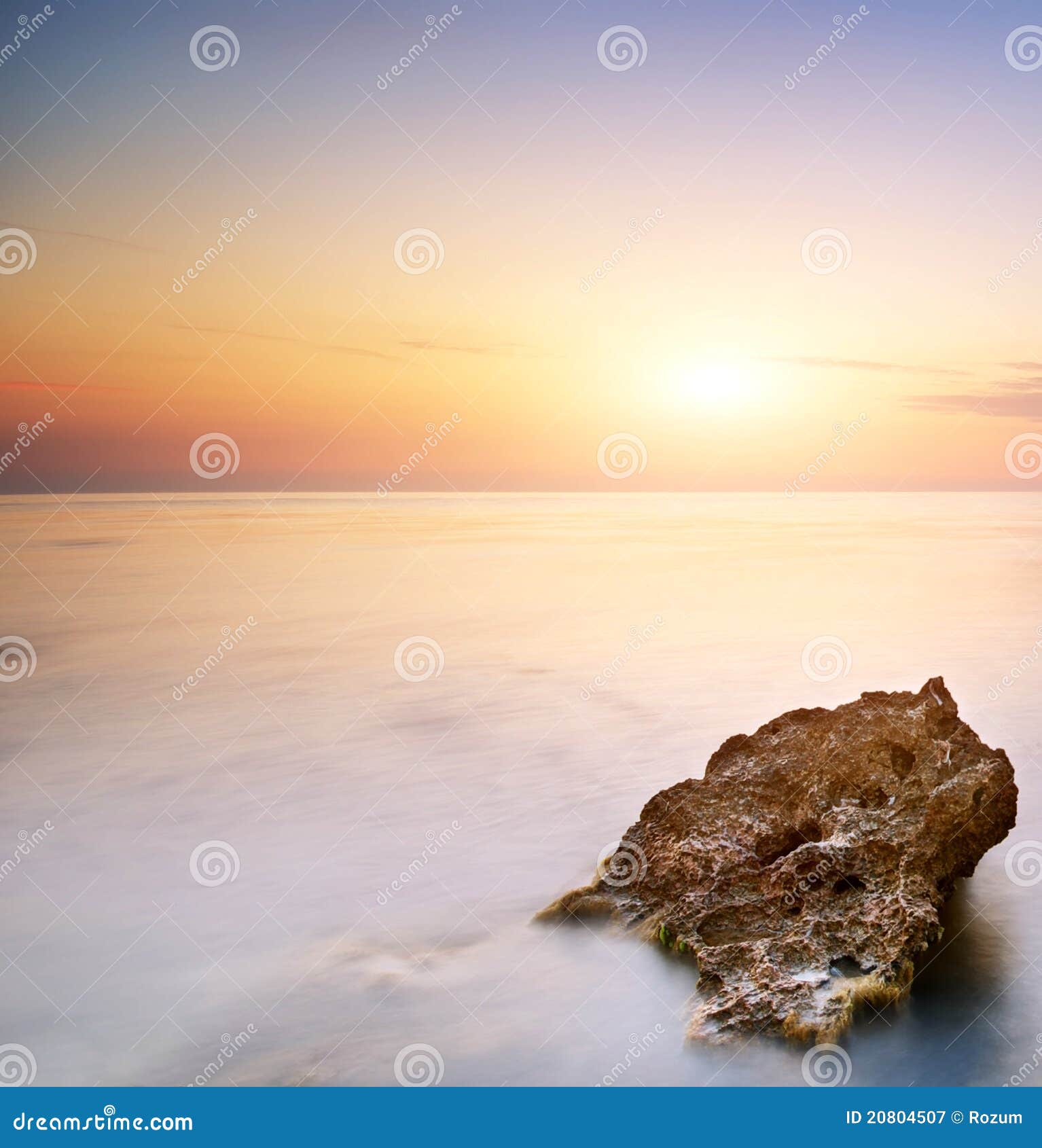 Sea and rock at the sunset stock image. Image of night - 20804507