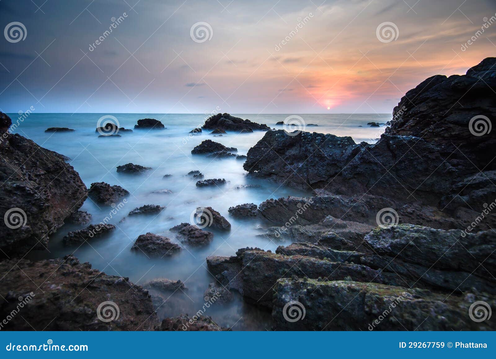 Sea and rock at the sunset stock image. Image of seascape - 29267759