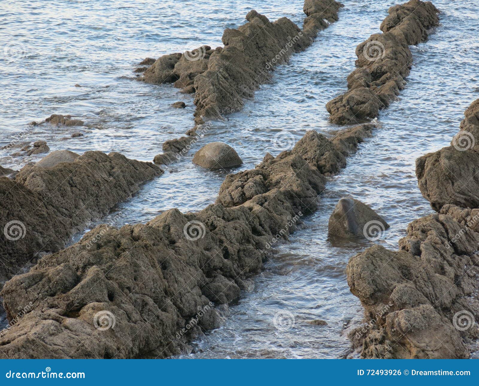 Sea Rocks stock photo. Image of reaching, ocean, spit - 72493926