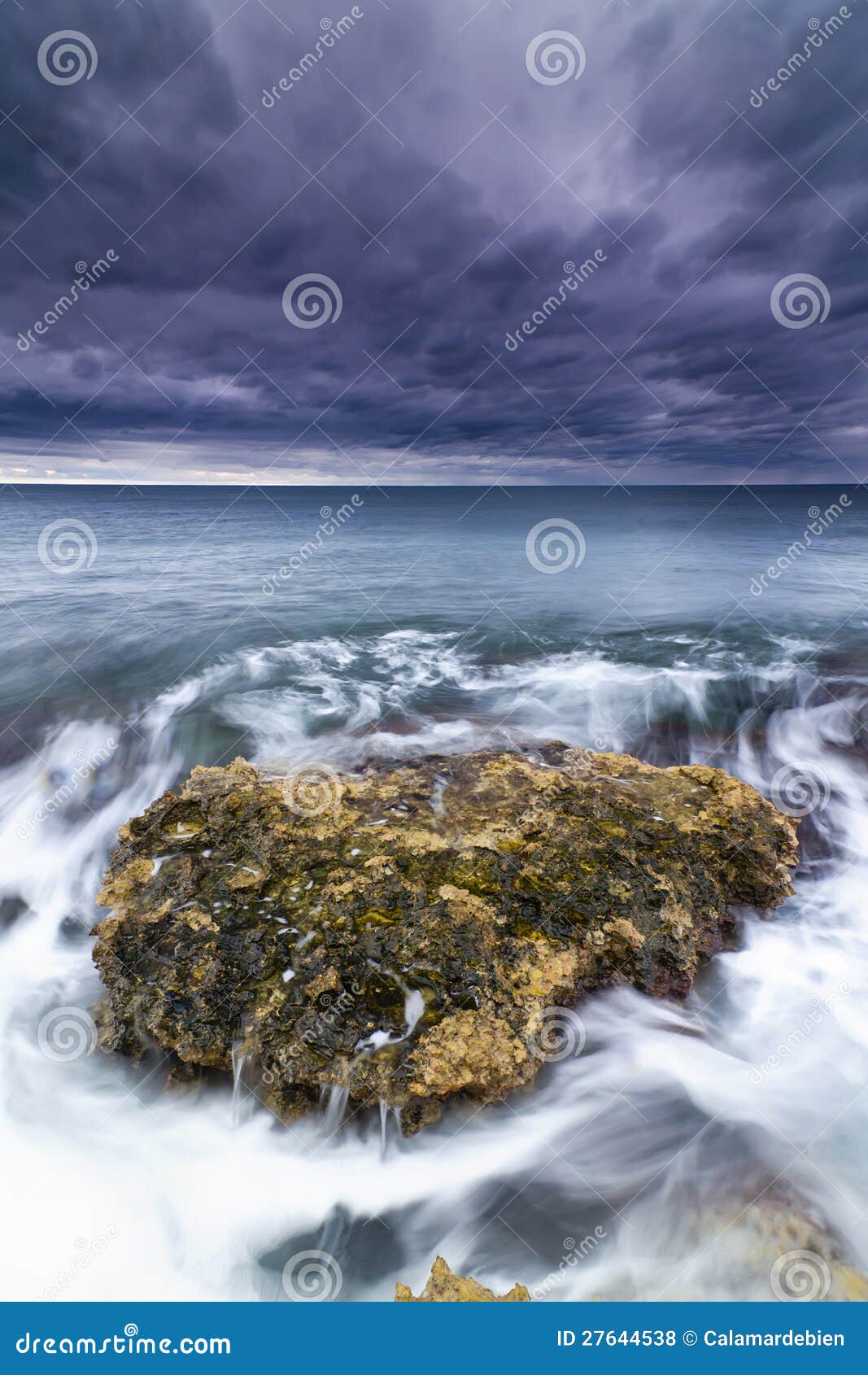 Sea, Rocks and Foam Under a Stormy Sky. Stock Photo - Image of clouds ...
