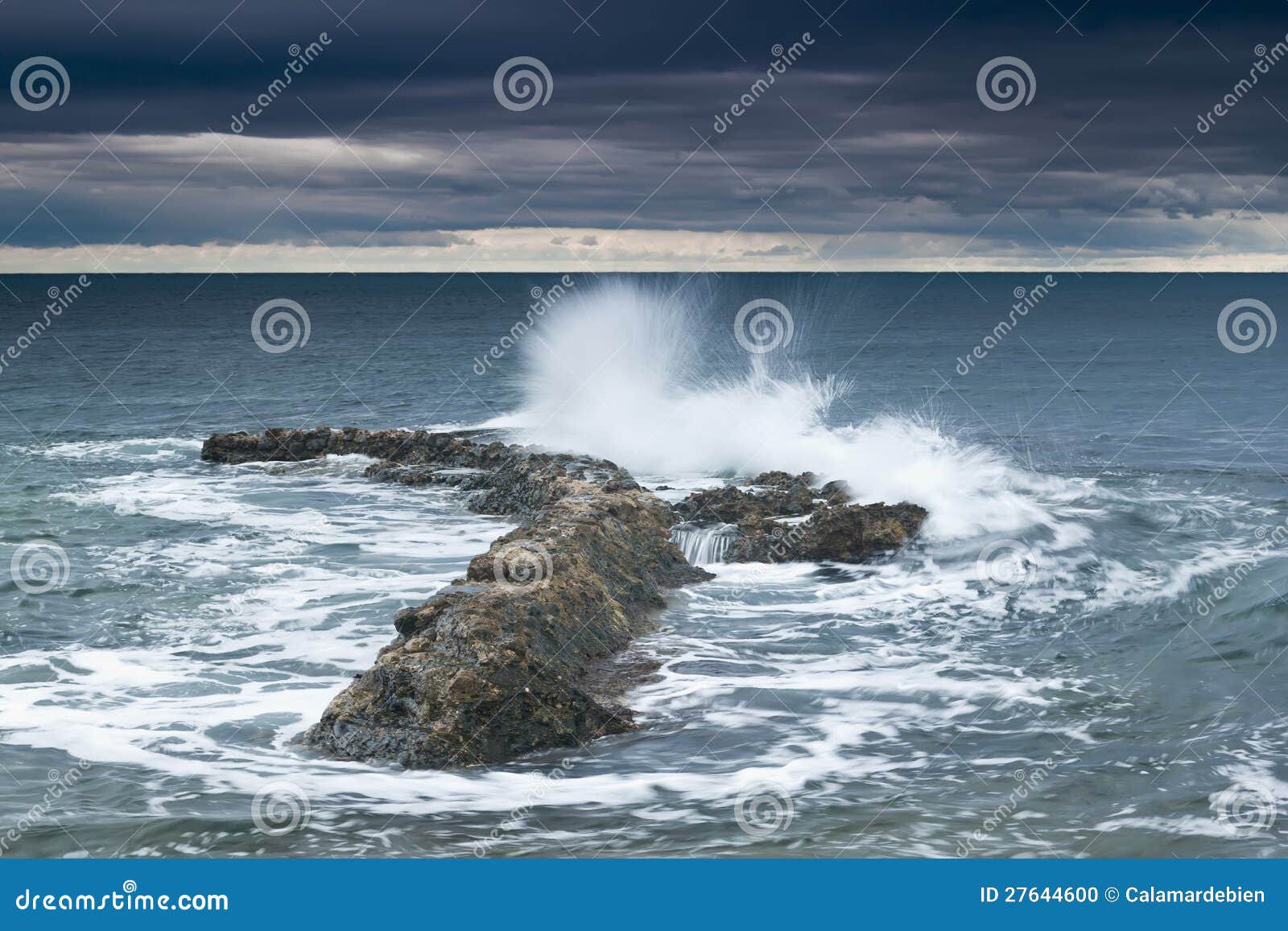 Sea, Rocks and Foam Under a Stormy Sky. Stock Photo - Image of power ...