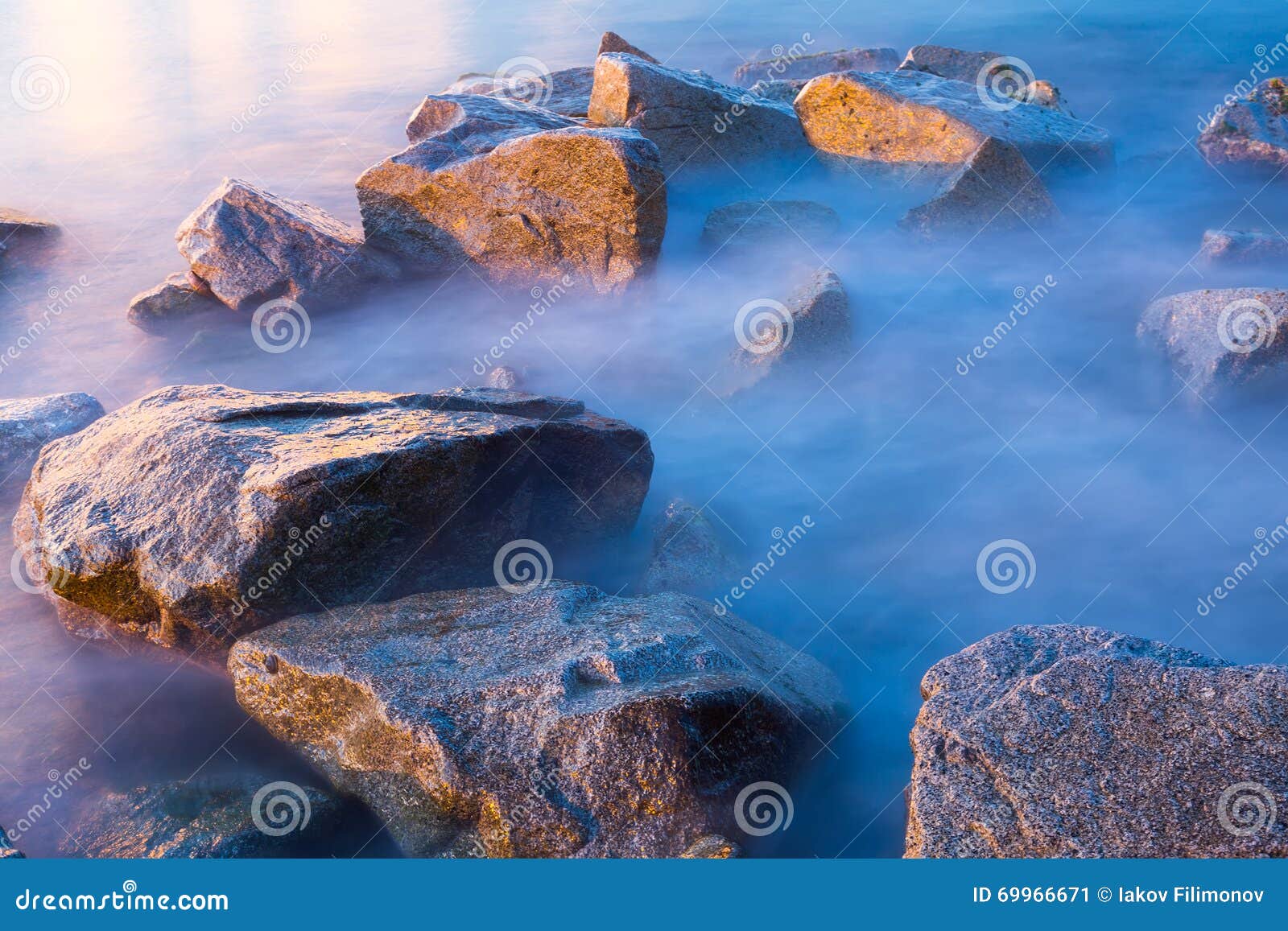 Sea Rocks in Haze at Sunset Stock Image - Image of sunset, hazy: 69966671