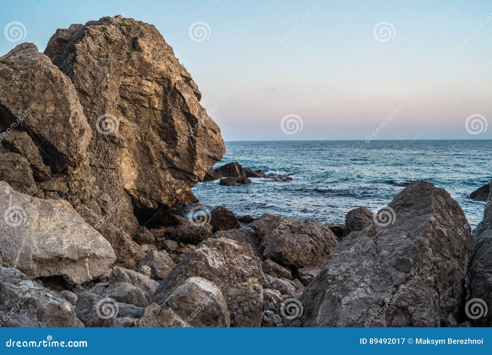 Sea and rocks at sunset stock image. Image of europe - 89492017