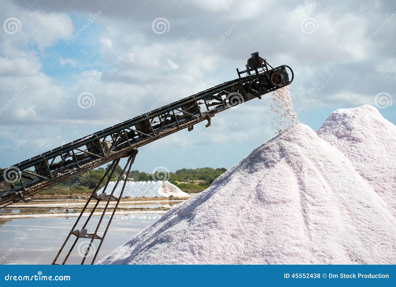 Sea salt production. stock photo. Image of machinery - 45552438