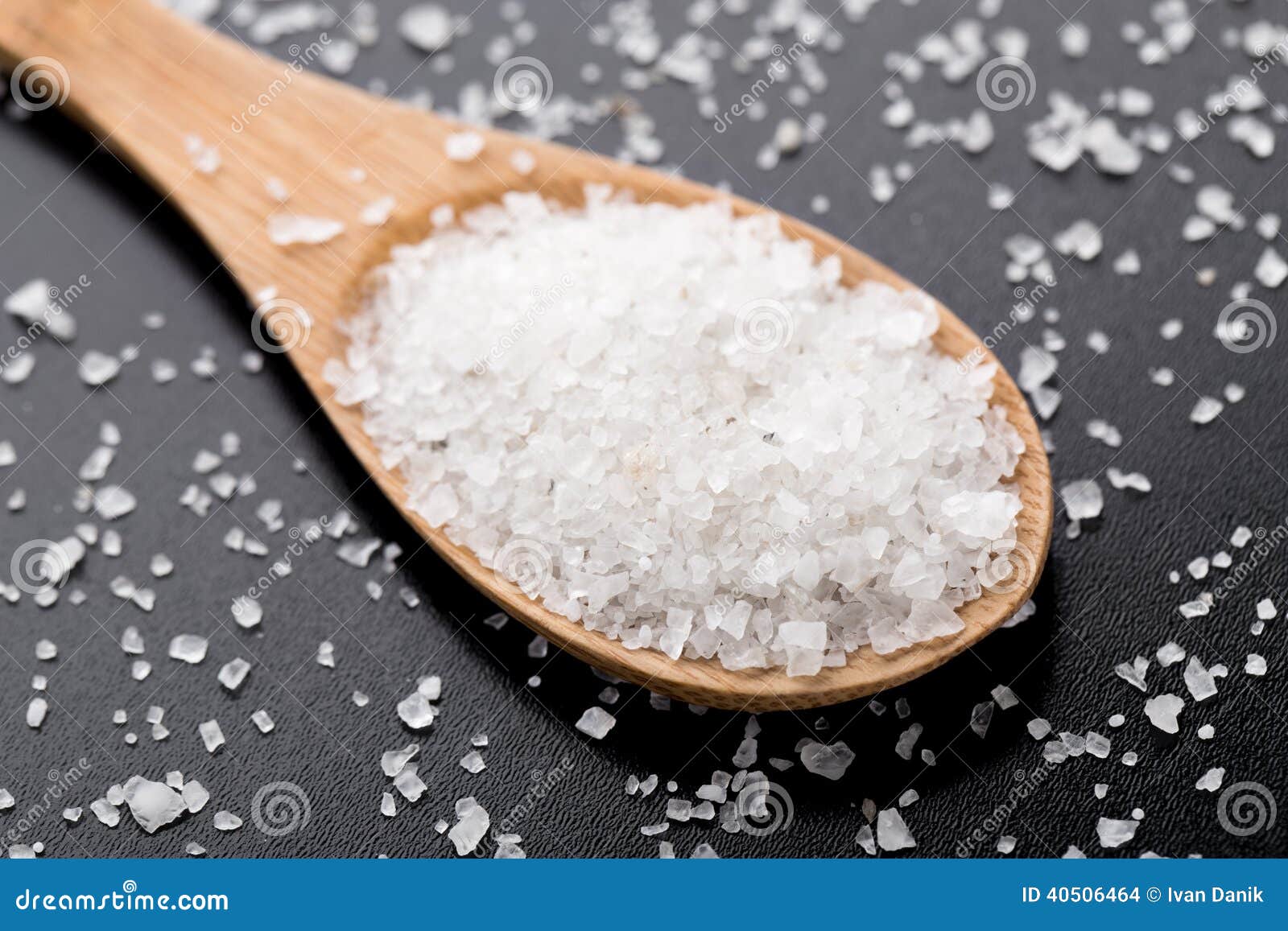 Sea salt in wooden spoon stock photo. Image of clean - 40506464