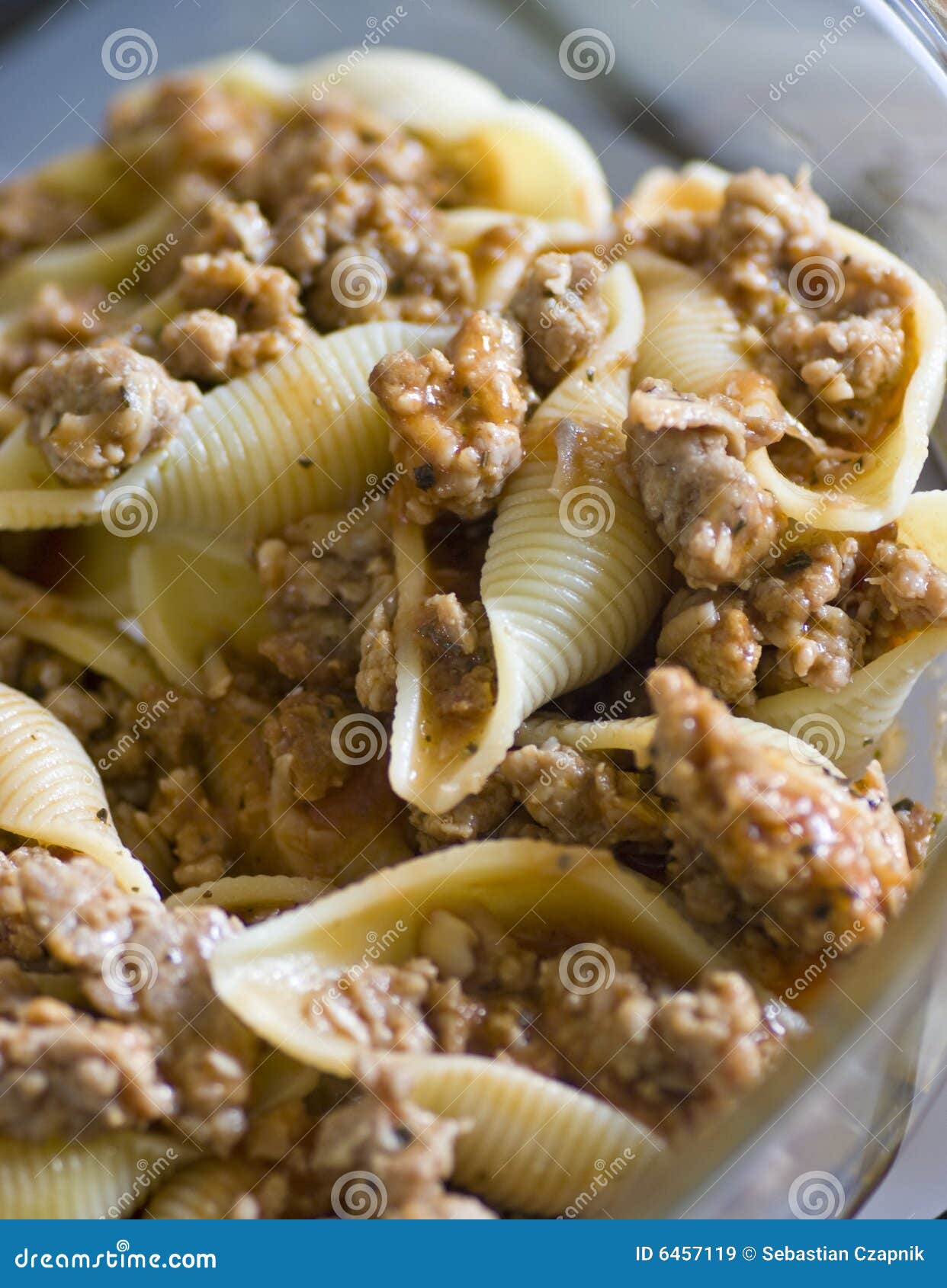 Sea shells pasta with meat stock image. Image of square - 6457119