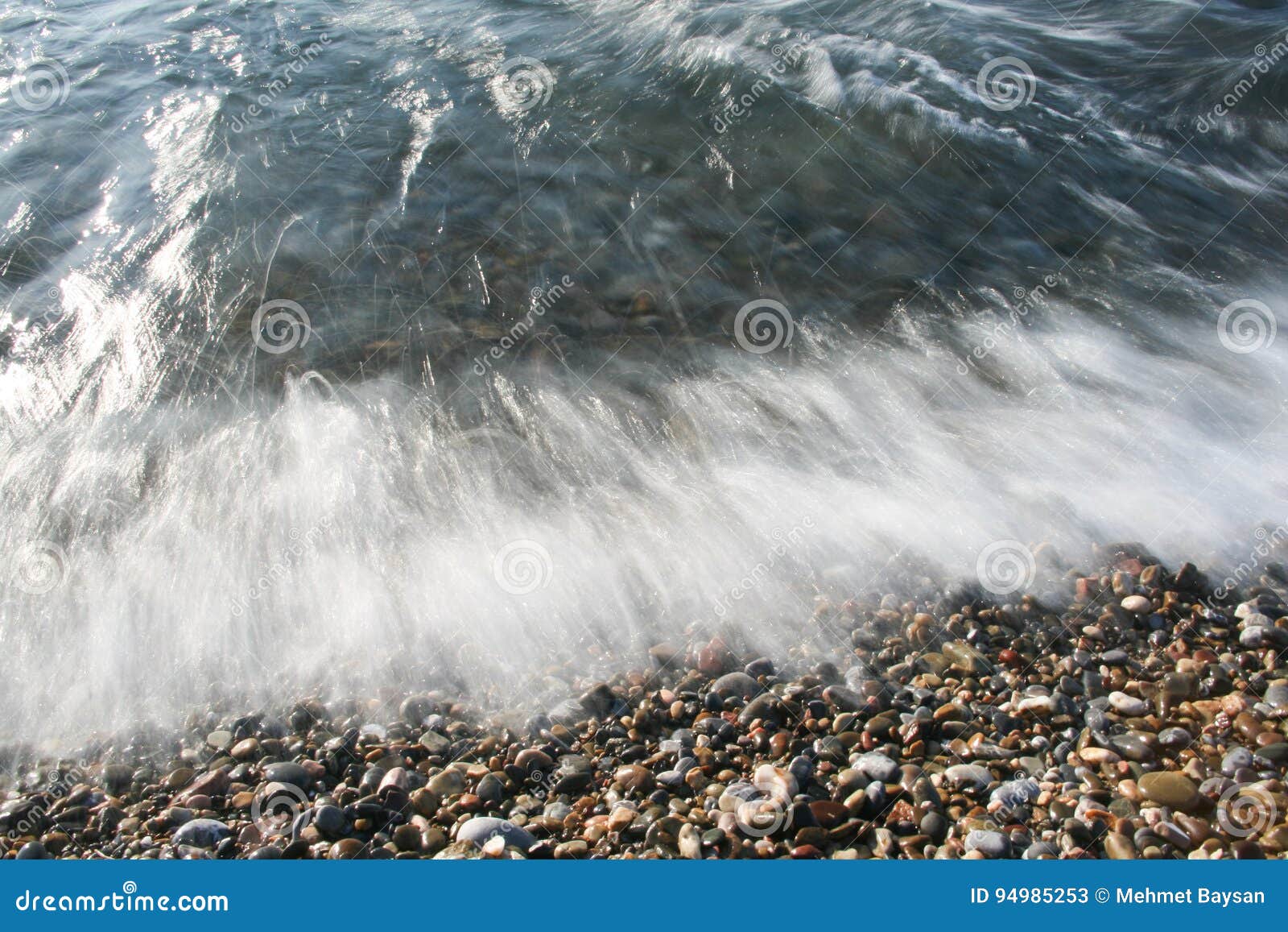 Sea Shock Wave Foam on the Pebble Stone Beach Stock Image - Image of ...