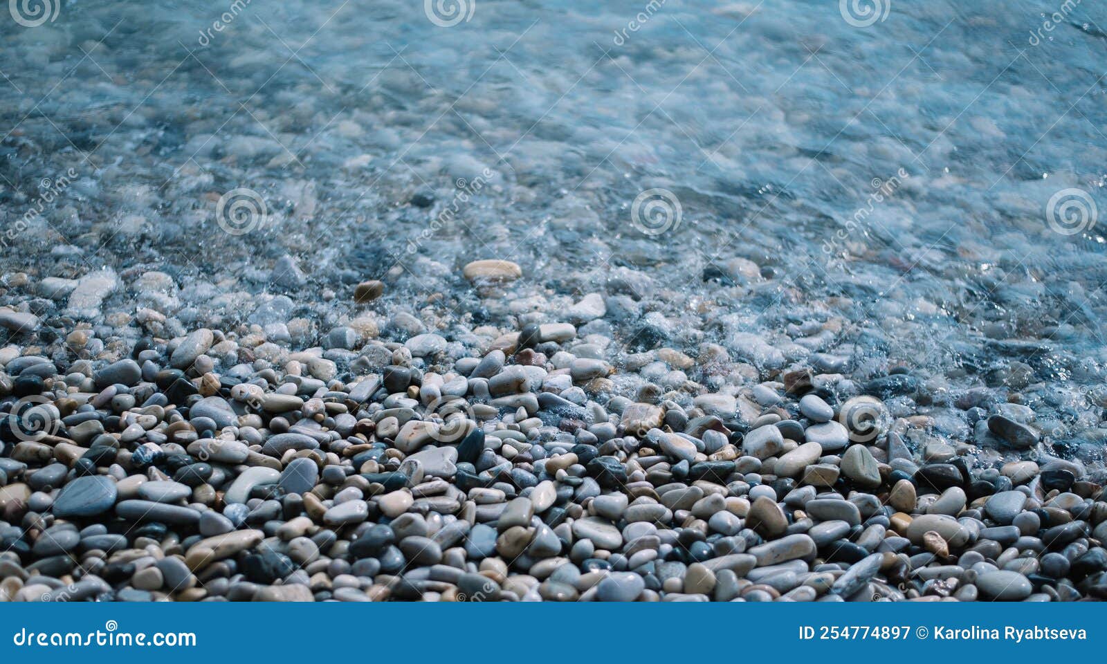 Sea shore with blue water stock image. Image of water - 254774897