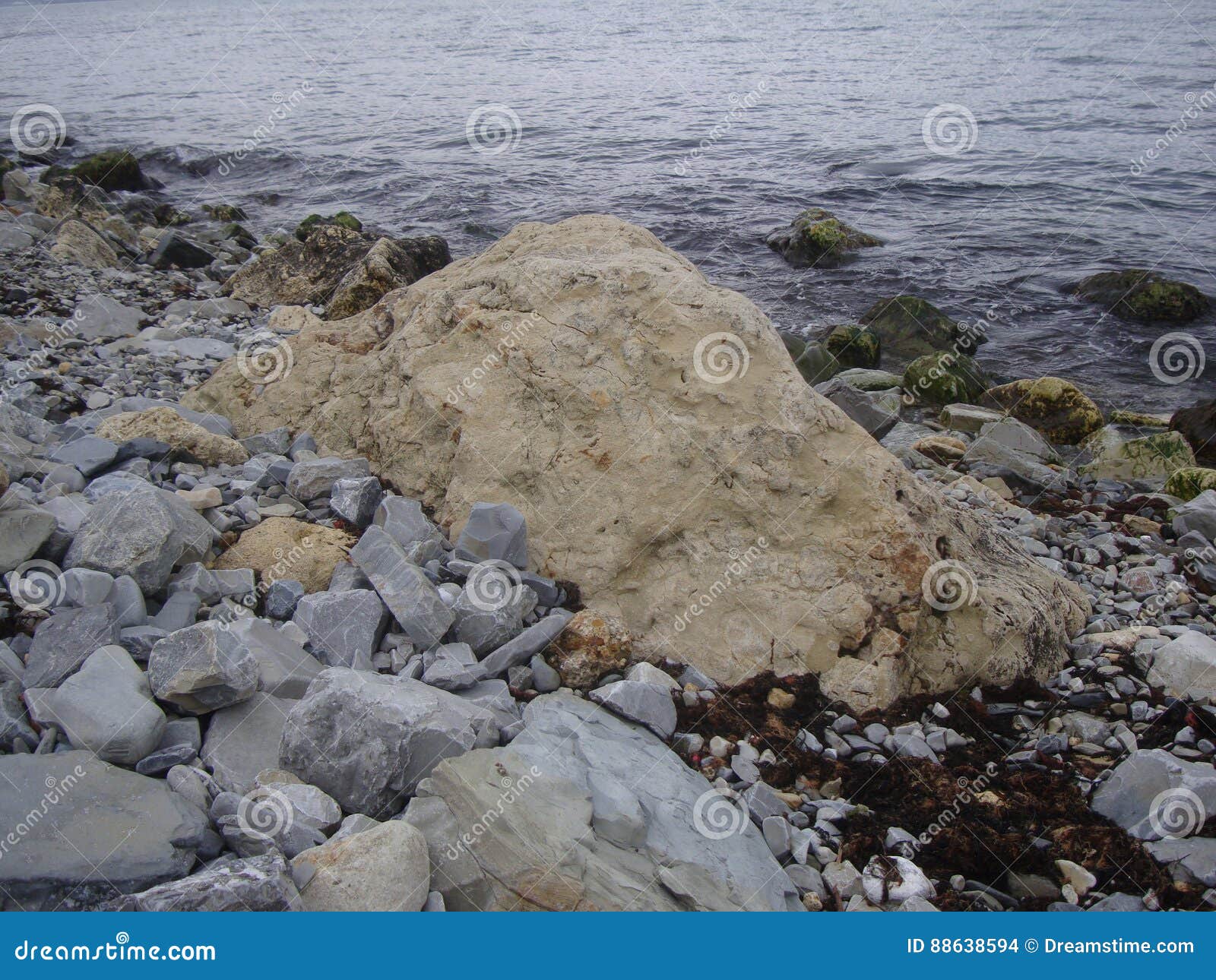 SEA SIDE with BIG STONE stock photo. Image of stone, retriever - 88638594