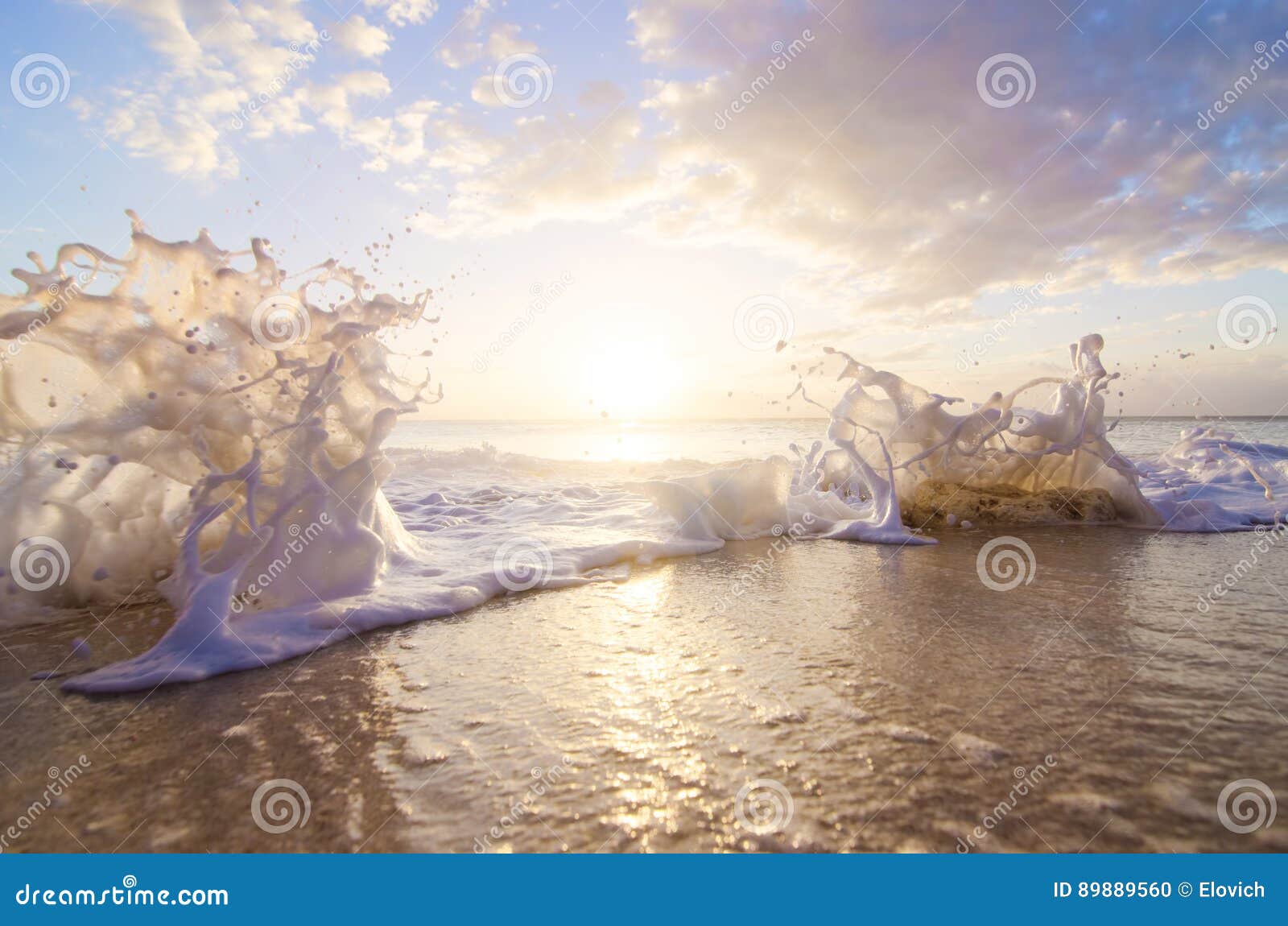 Sea splash at sunset stock photo. Image of light, beauty - 89889560
