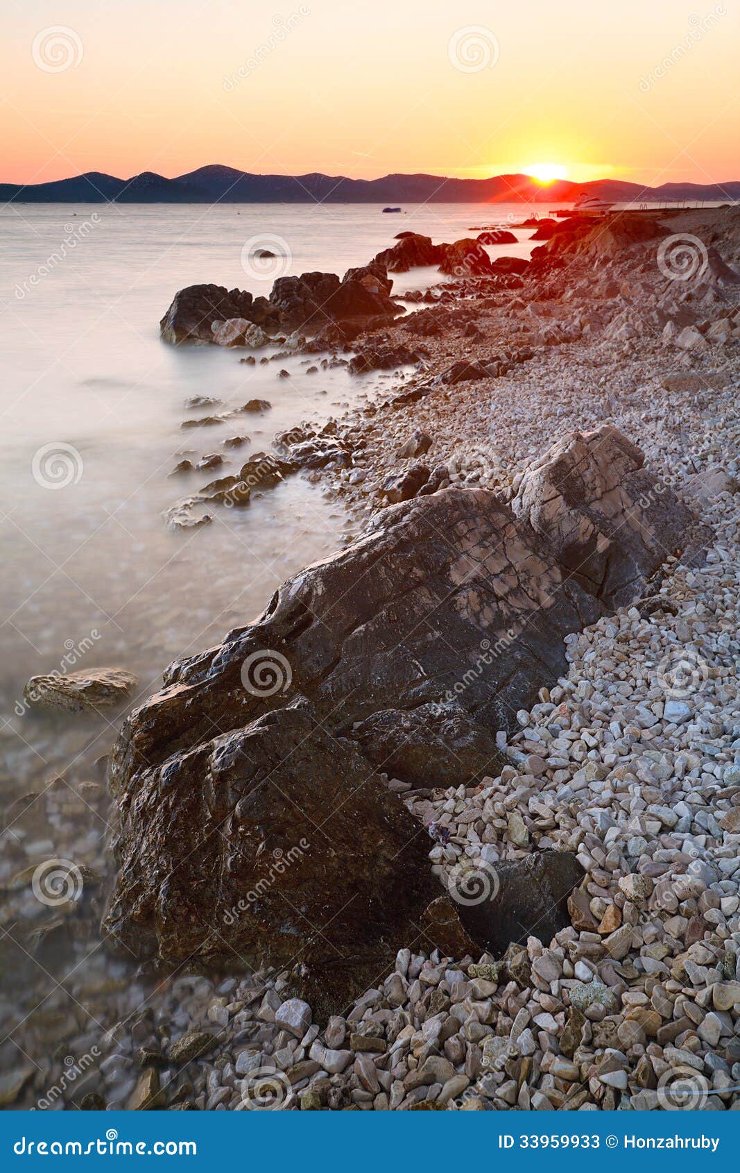 Sea Stones on Beach at Sunset Stock Image - Image of rock, beauty: 33959933