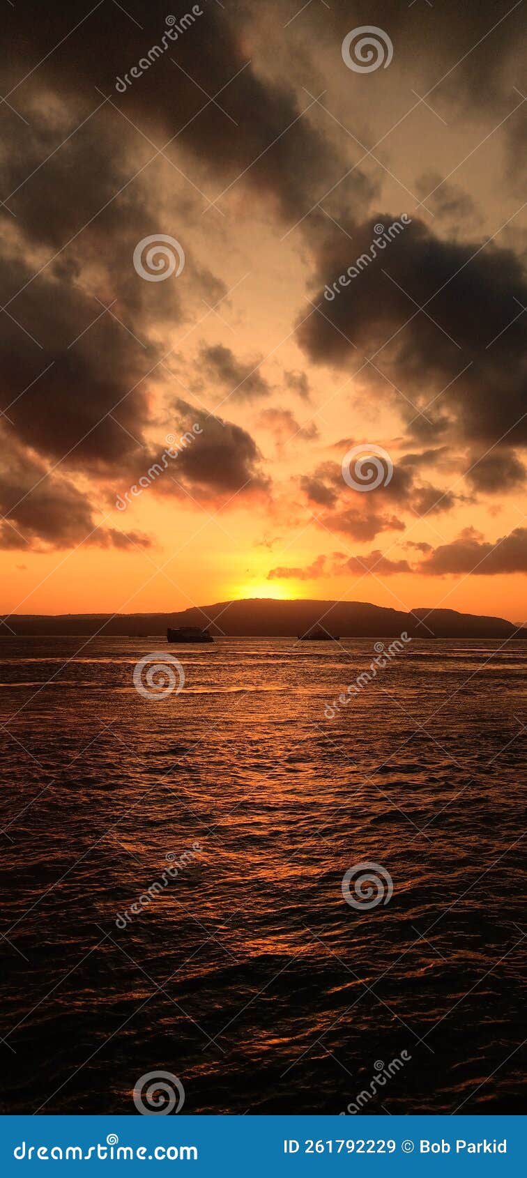 Sea Sunset in Bali and Java Time Zone Difference. Stock Image - Image ...
