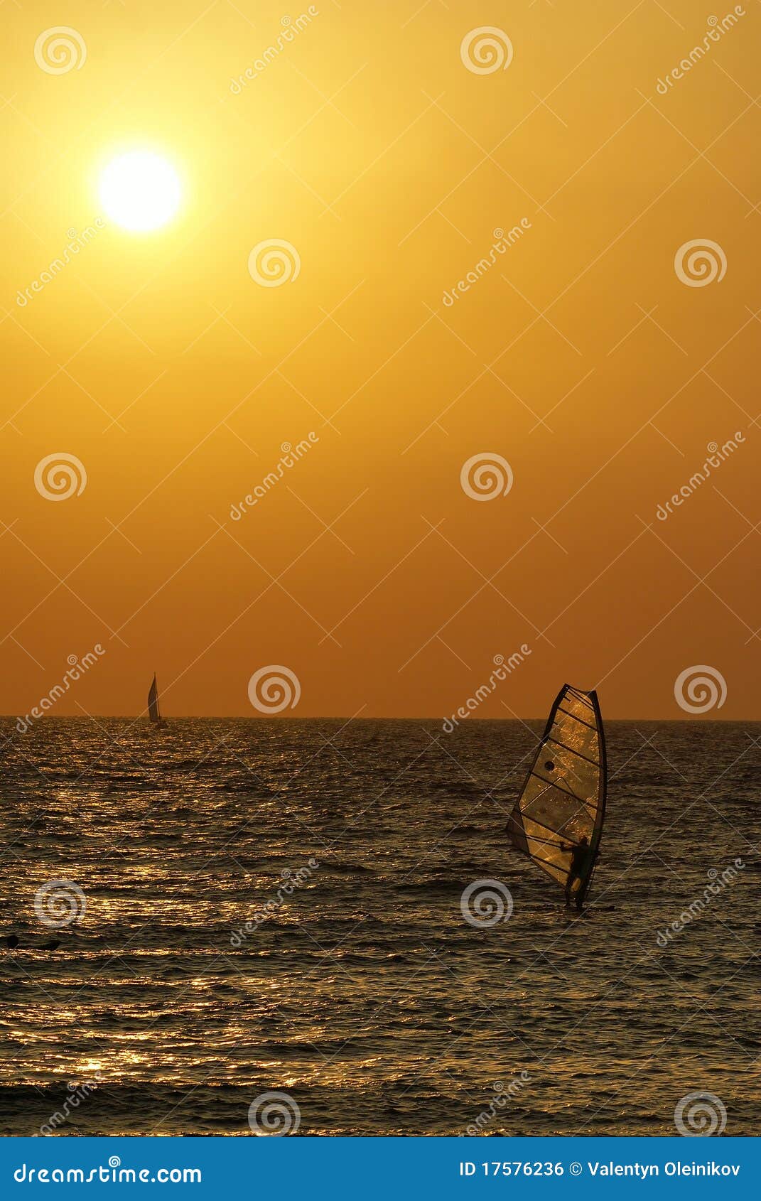 Sea sunset with windsurfer stock photo. Image of calm - 17576236