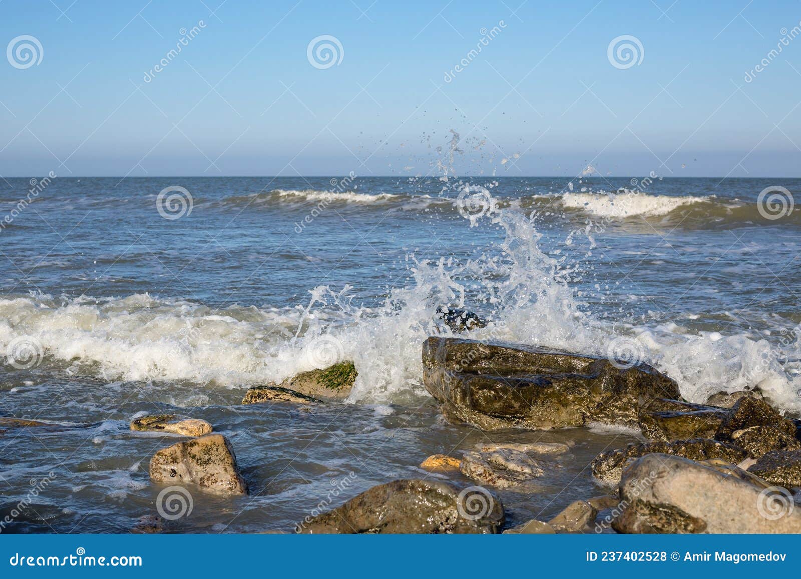 Waves are Beating Against Rocks on the Seashore. Stock Photo - Image of ...