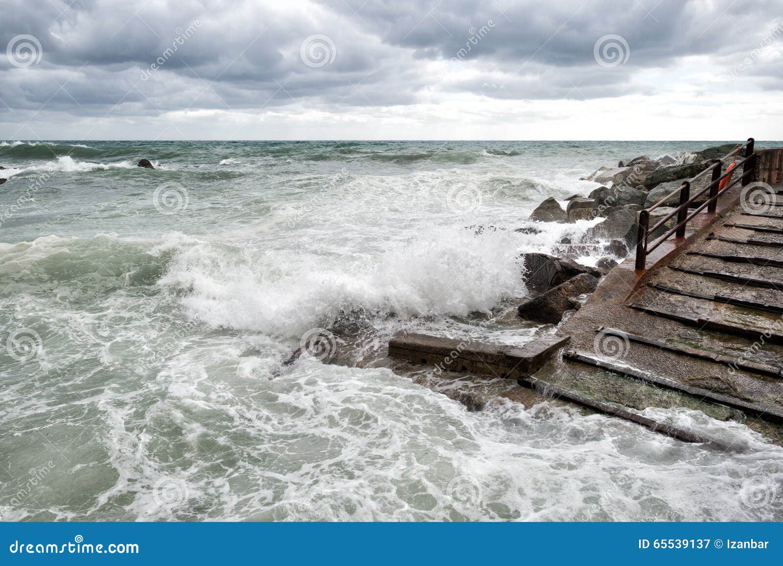 Sea in tempest on rocks stock image. Image of country - 65539137