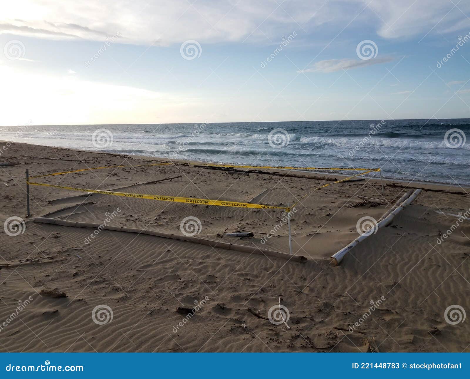 Sea Turtle Nesting Site on Beach with Water and Caution Tape Stock ...