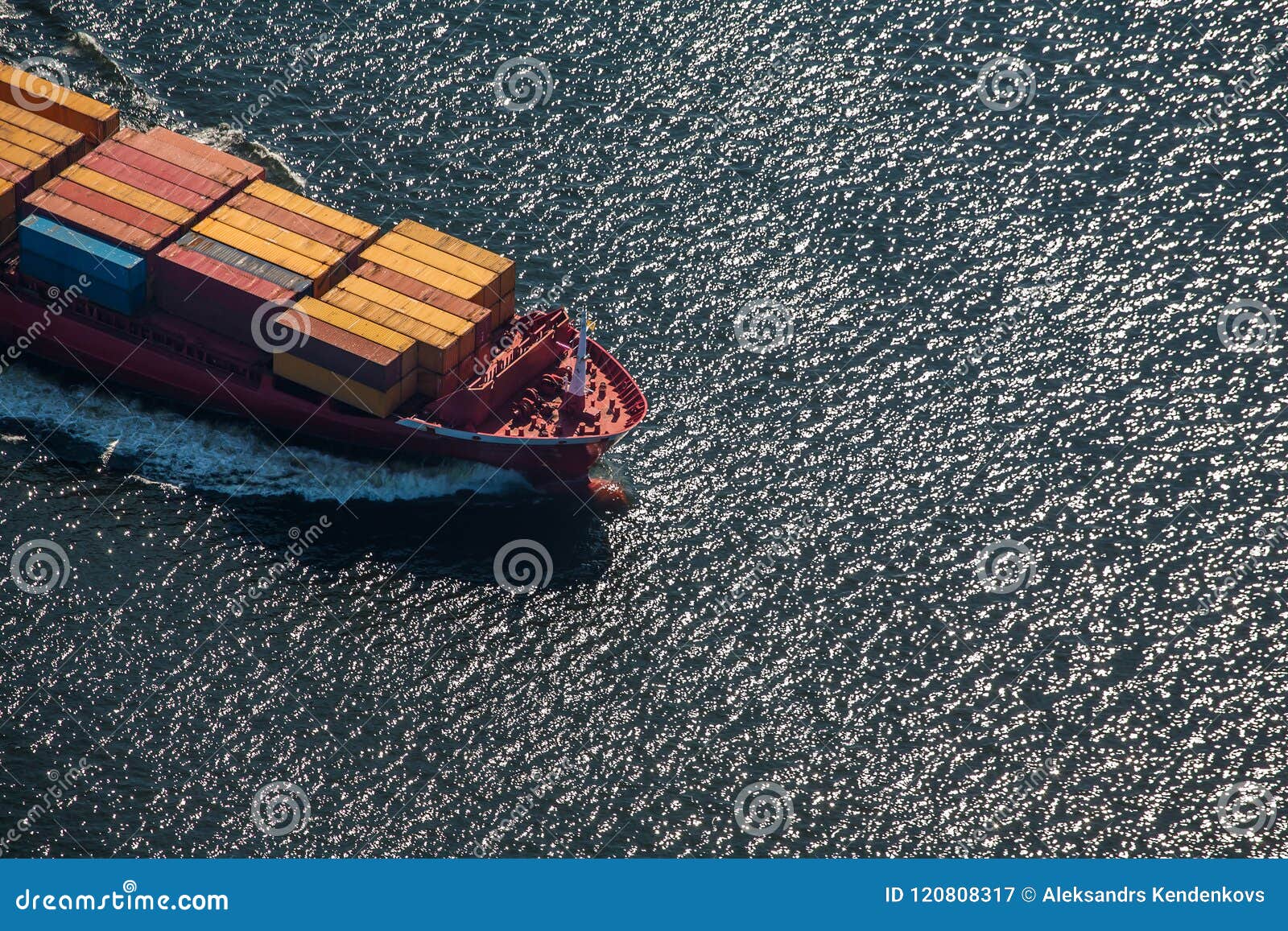 A Sea Vessel is a Container Ship at Full Speed in the Open Sea. View ...