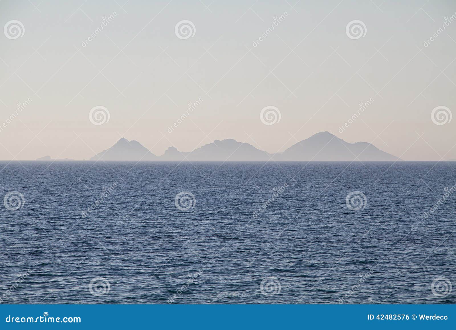 Sea View of a Far Away Island Stock Photo - Image of view, blue: 42482576