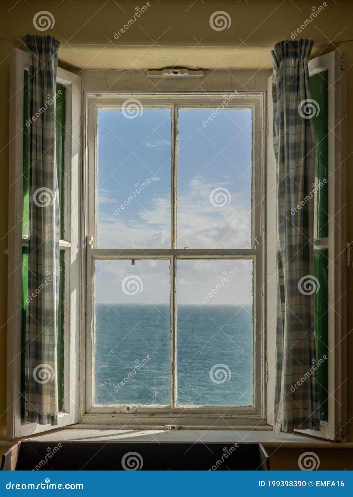 Sea View Out an Old Irish Window, with Shutters and Curtains Stock ...