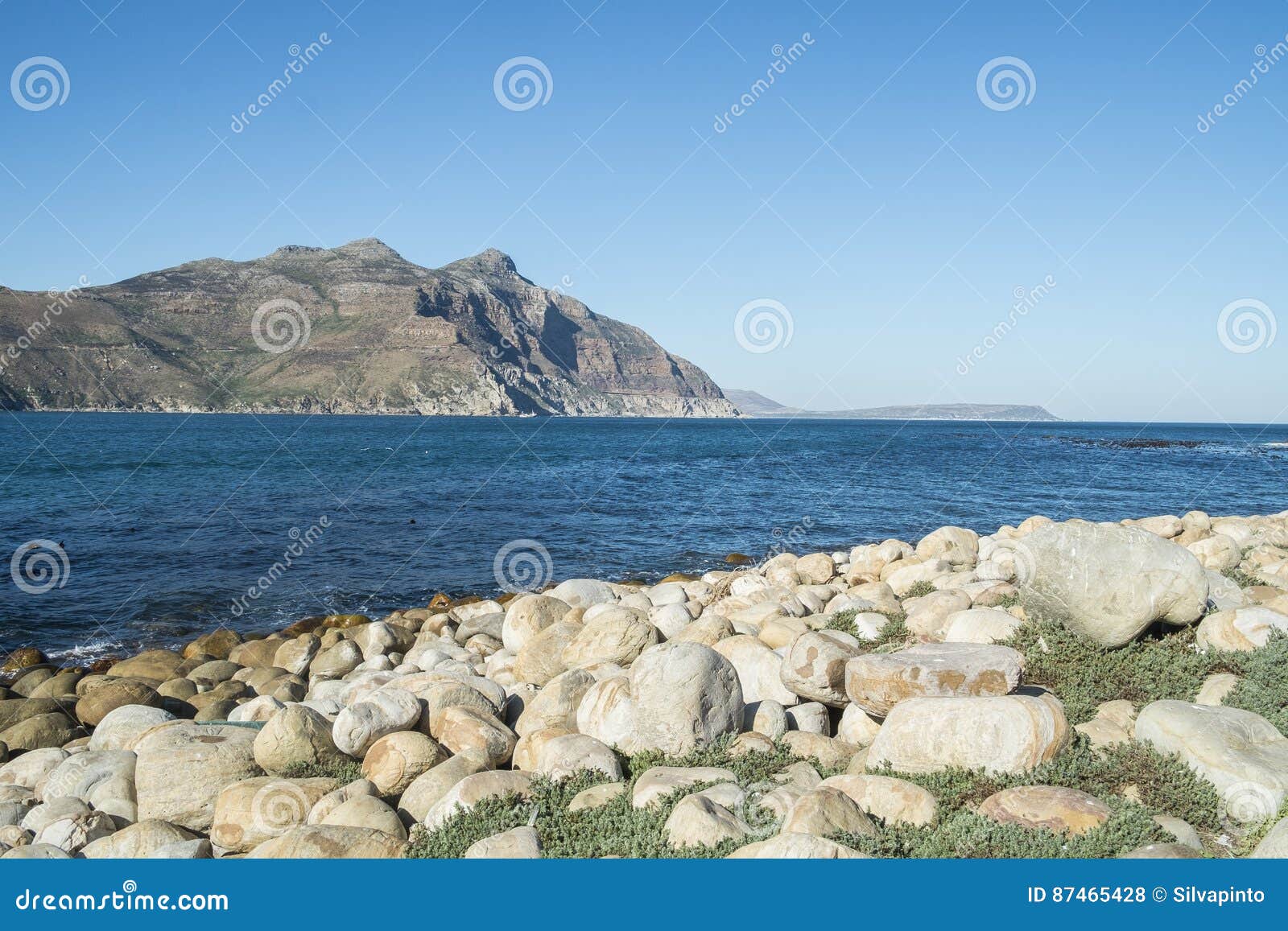 Sea View with Rocks and Mountain in Cape Town Stock Photo - Image of ...