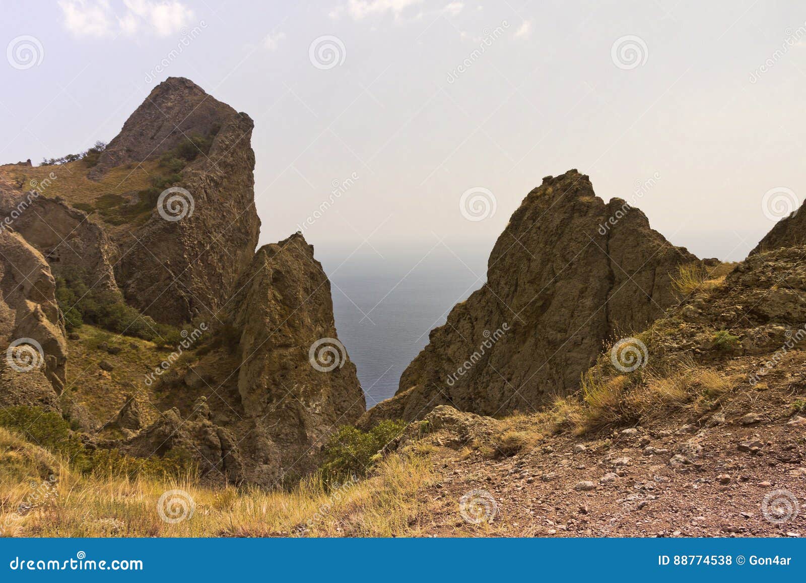 Sea View in between Two Cliffs of the Mountain Massif Kara-dag. Stock ...
