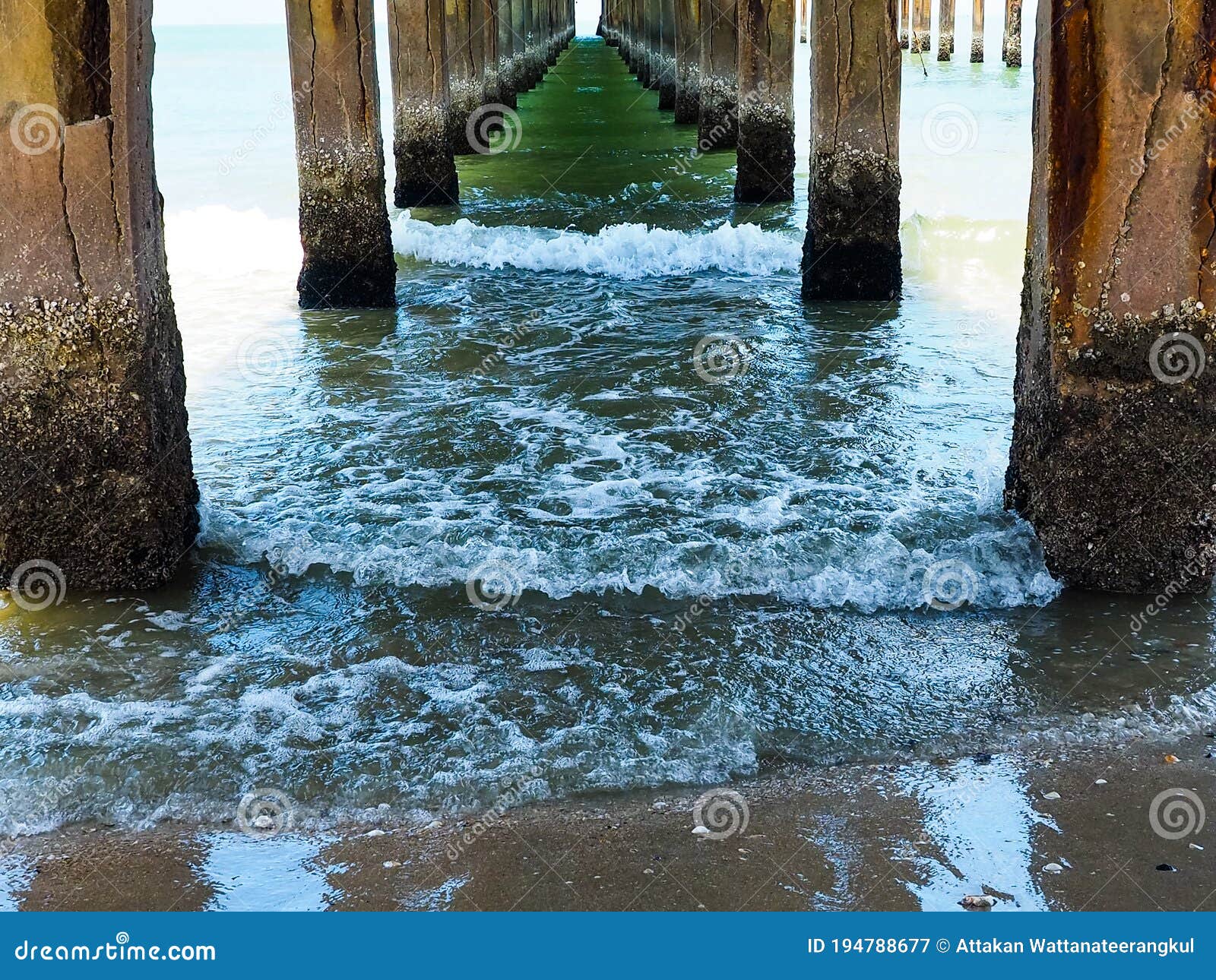 Sea Water and Weathered Bridge Columns Stock Image - Image of colu ...