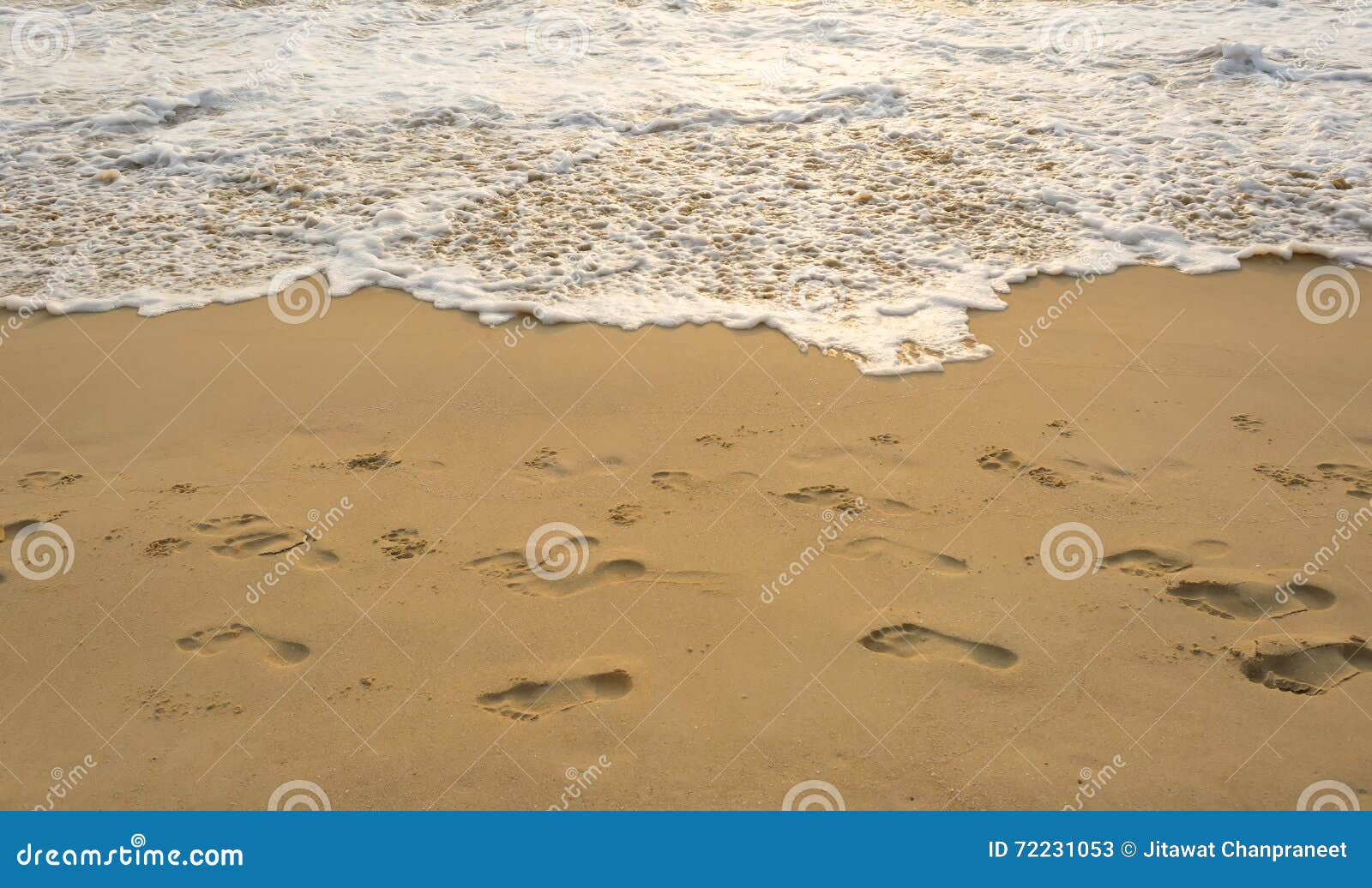 Sea Wave and Many Foot Print on the Beach Background Stock Image ...