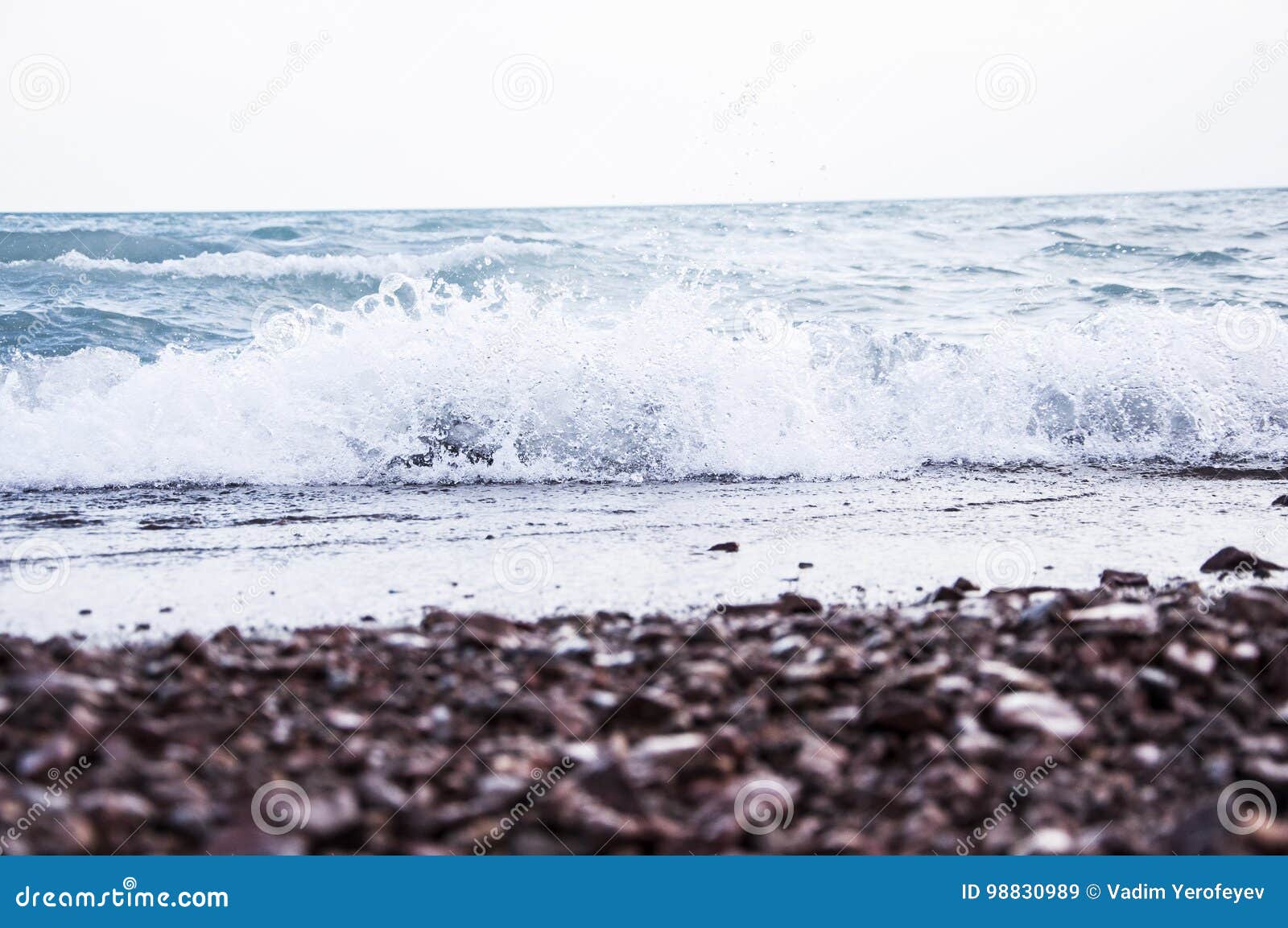 Sea wave and pebble beach stock image. Image of background - 98830989