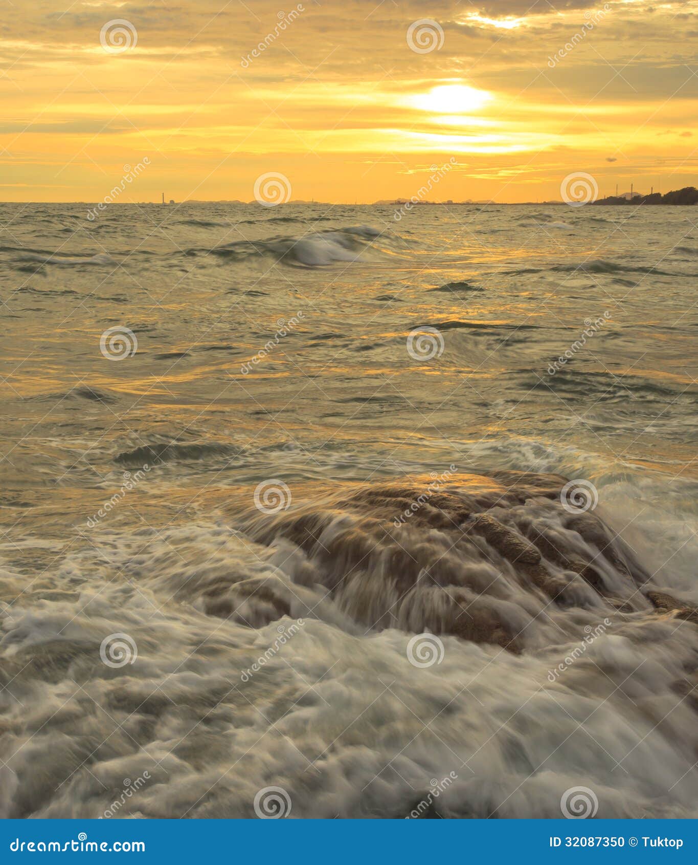 Sea wave and rock sunset stock photo. Image of dusk, saturated - 32087350