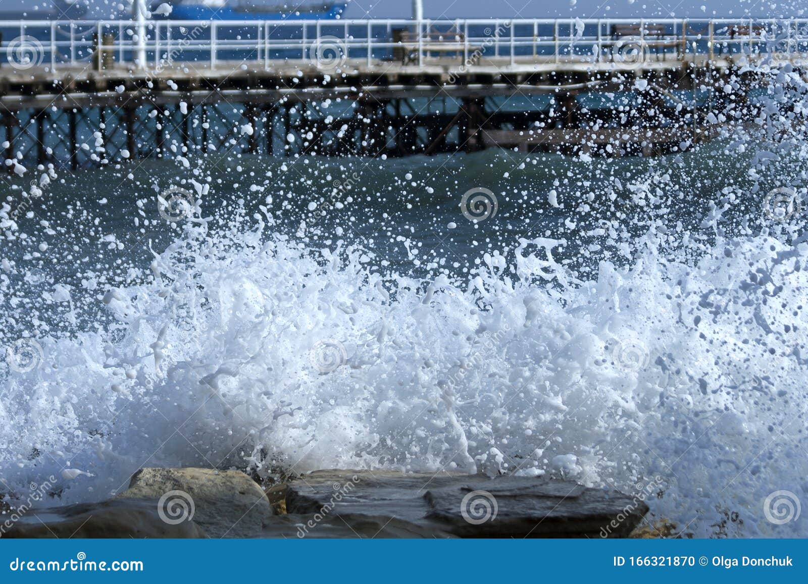 Sea wave splash on rocks stock photo. Image of stone - 166321870